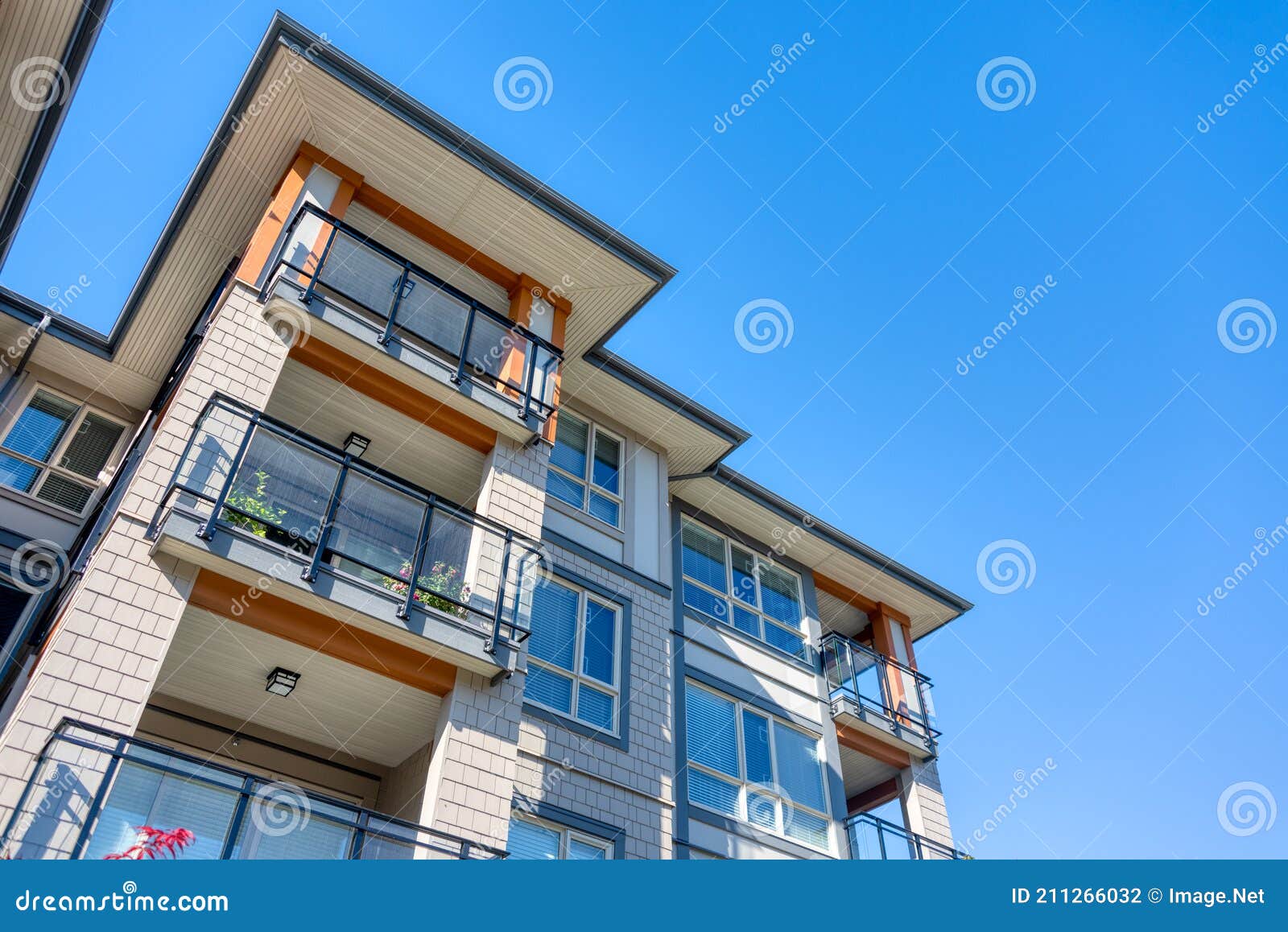 Corners of New Residential Building on Blue Sky Background Stock Photo ...