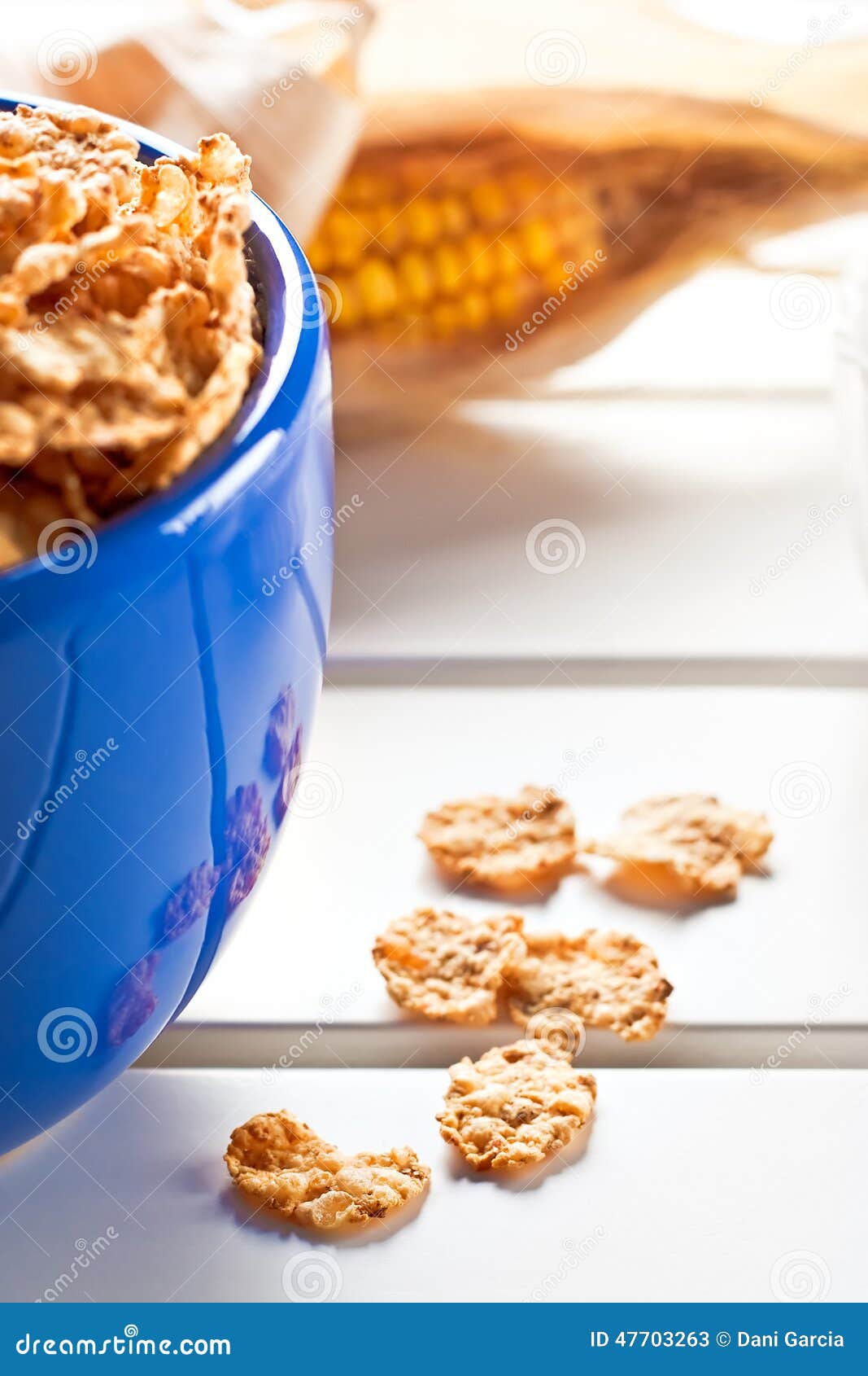 Cornflakes in a blue bowl stock image. Image of diet - 47703263