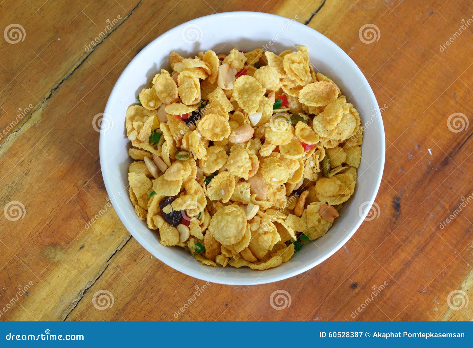 Cornflakes in Bowl on Table Stock Image - Image of table, raisin: 60528387