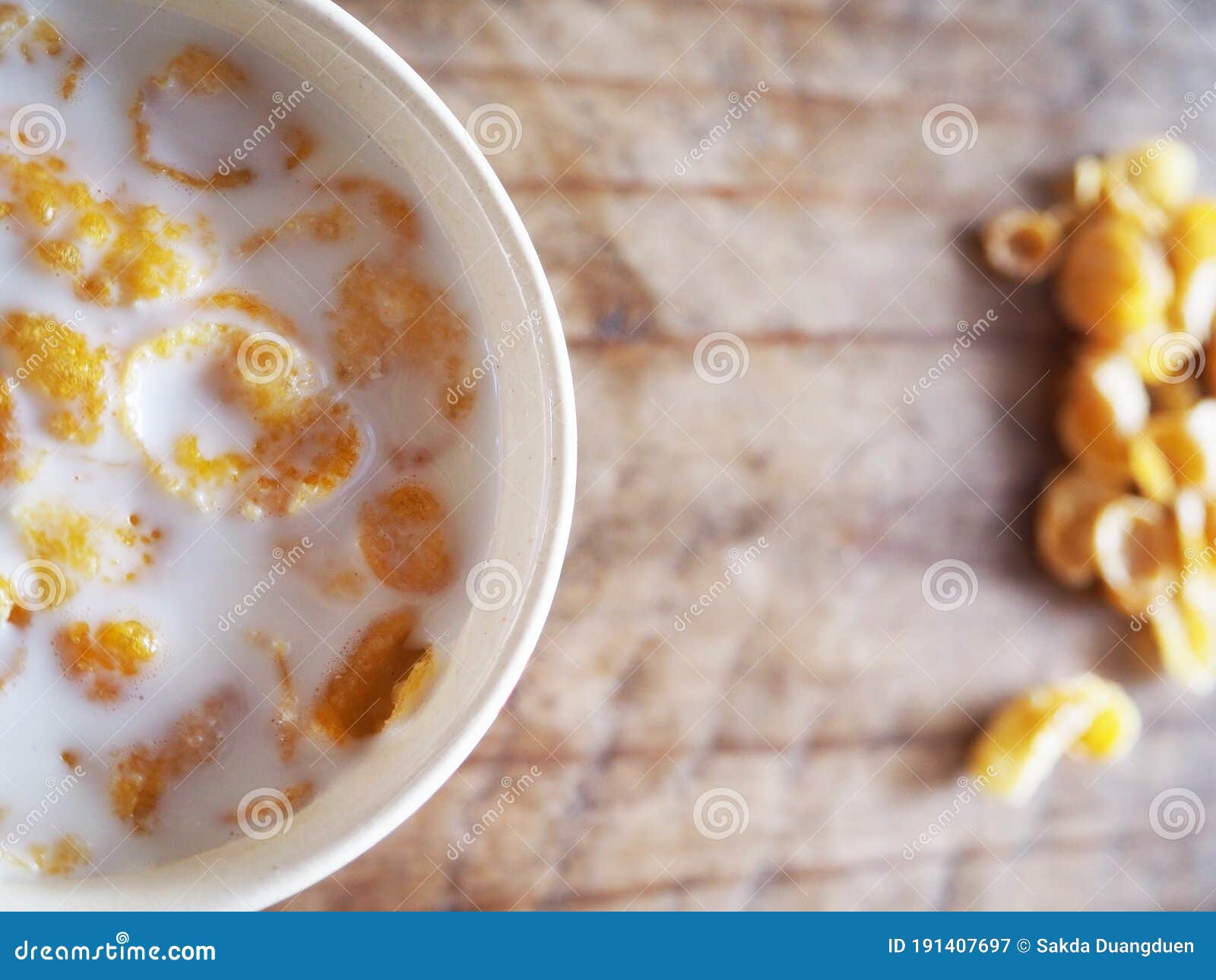 Cornflakes Breakfast With Milk In A Cup Stock Image - Image of blurred ...