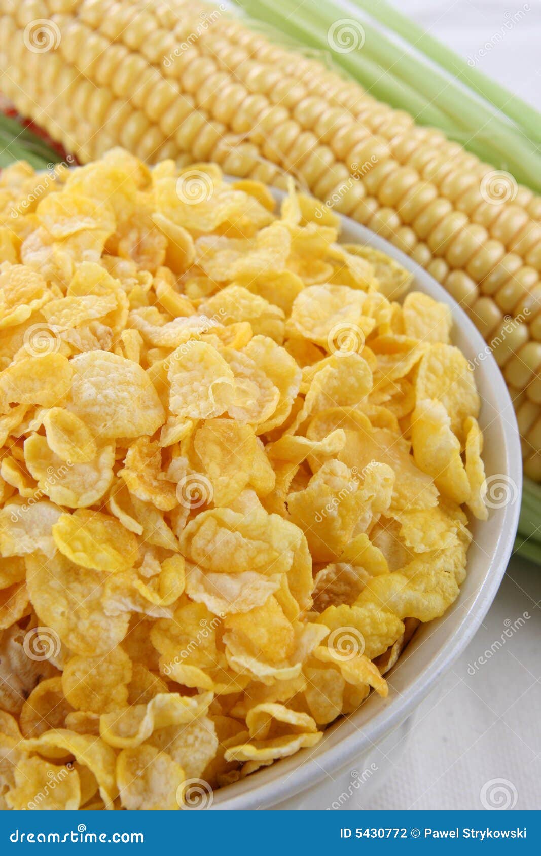 Cornflakes and cob stock photo. Image of bowl, green, vertical - 5430772