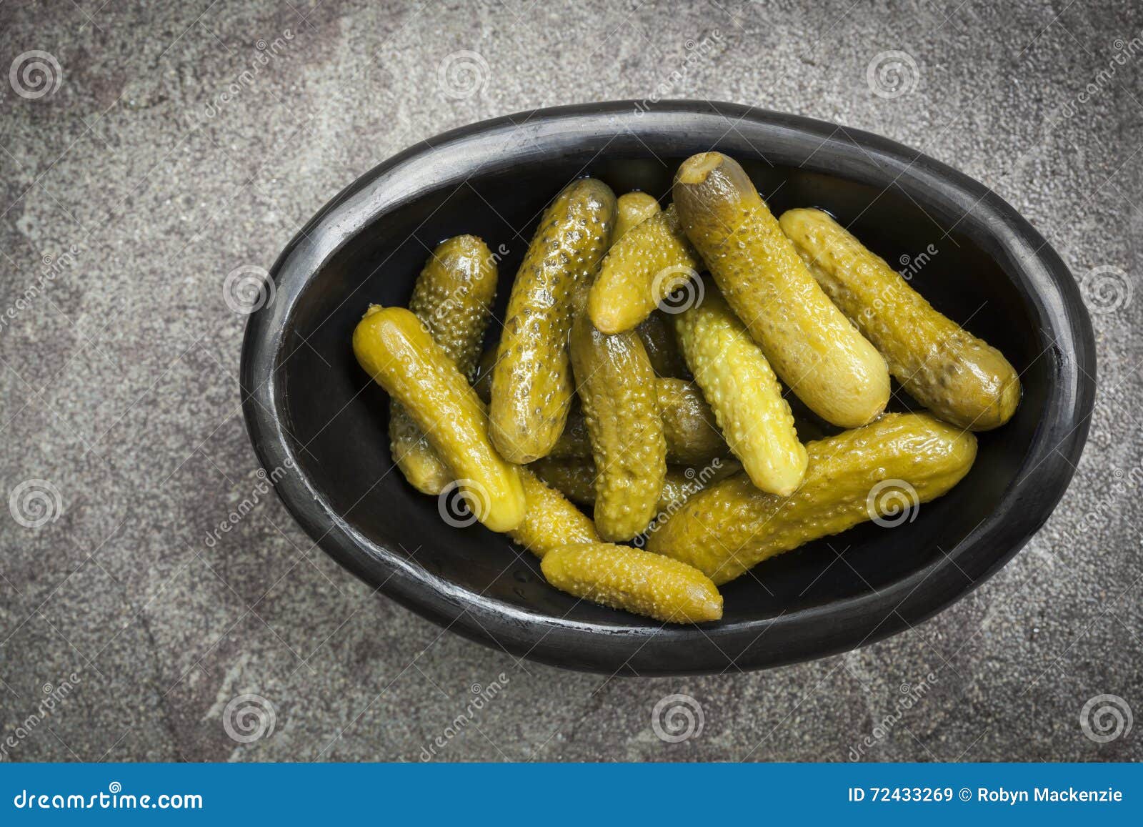 Cornichons in Black Dish on Slate Top View Stock Image - Image of bowl ...