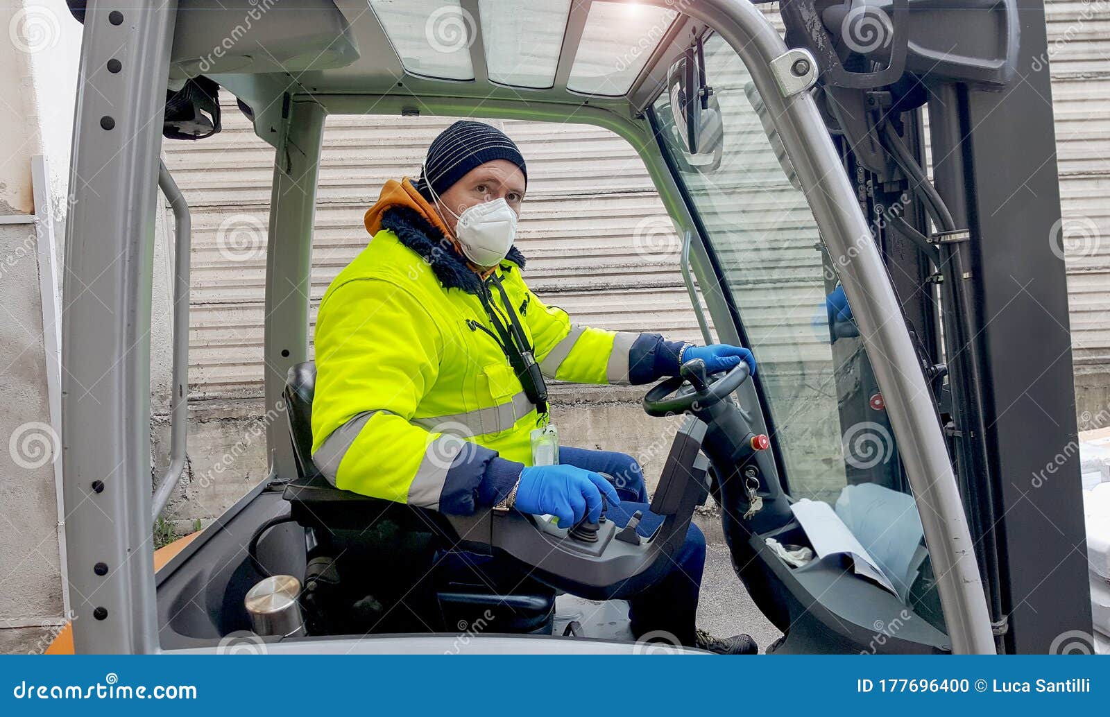 Coronavirus : Man Drives the Forklift Stock Photo - Image of pallet ...