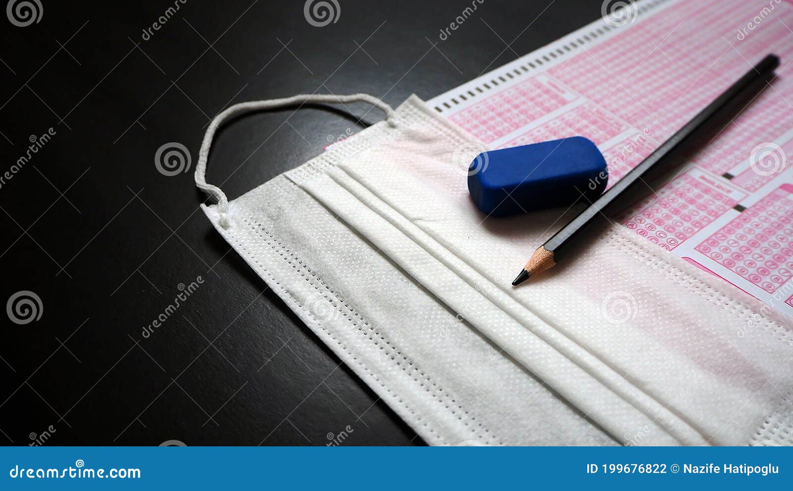 Coronavirus and Student Exams, Mask and Optical Exam Paper Stock Photo ...