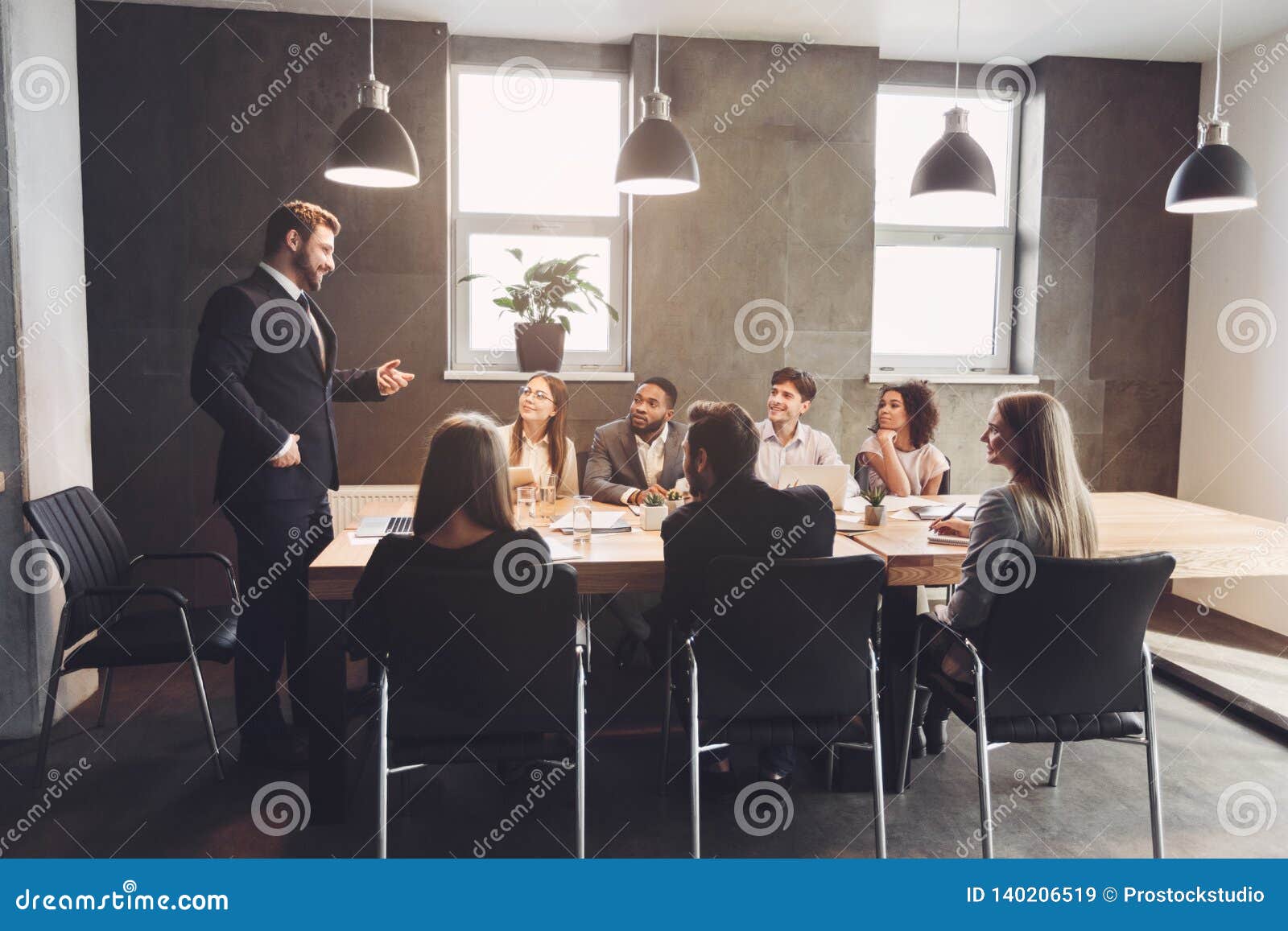 Corporate Business Team Discussing Project Plans in Office Stock Image ...