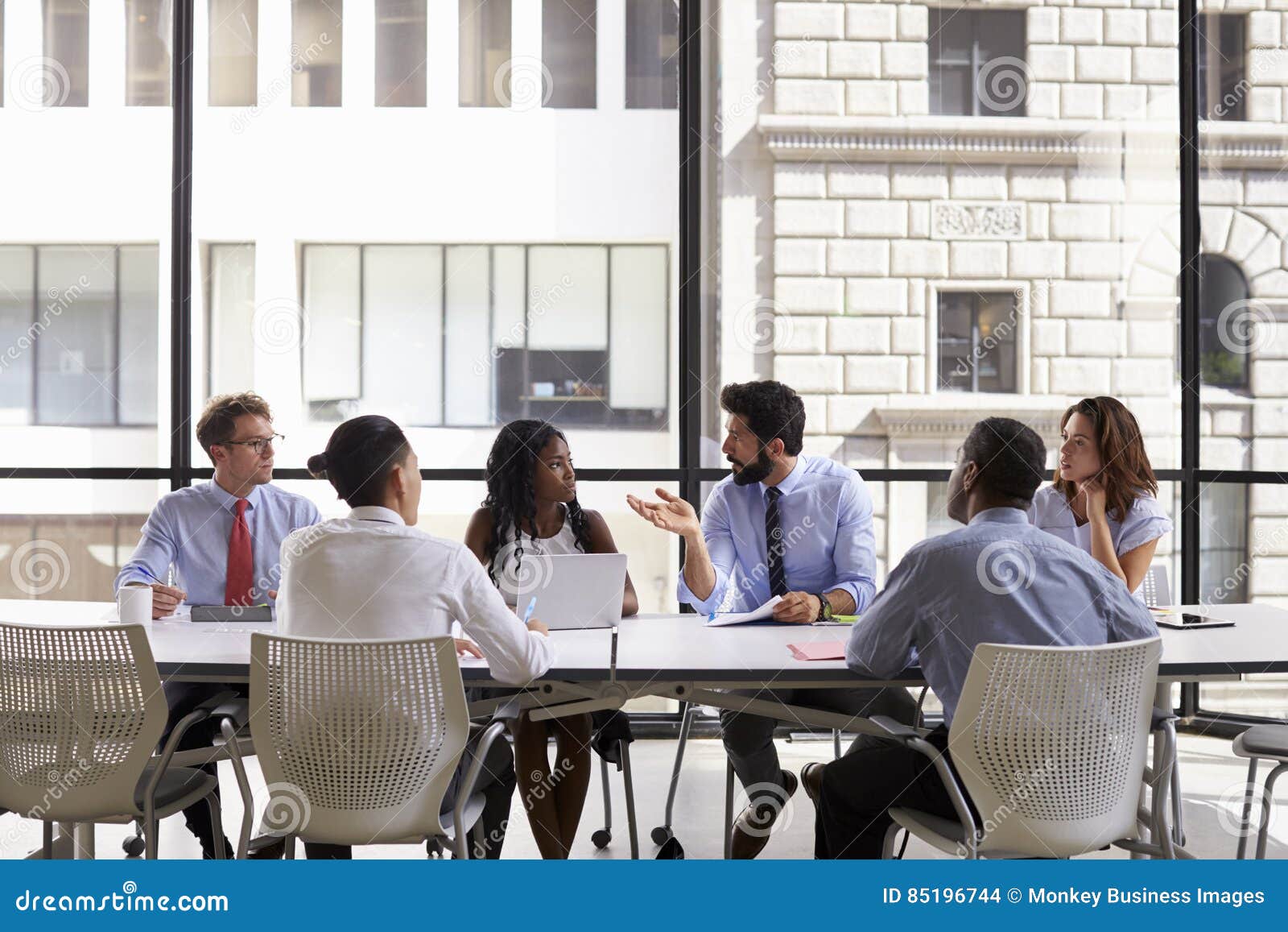 Corporate Business Team Meeting in a Modern Open Plan Office Stock ...