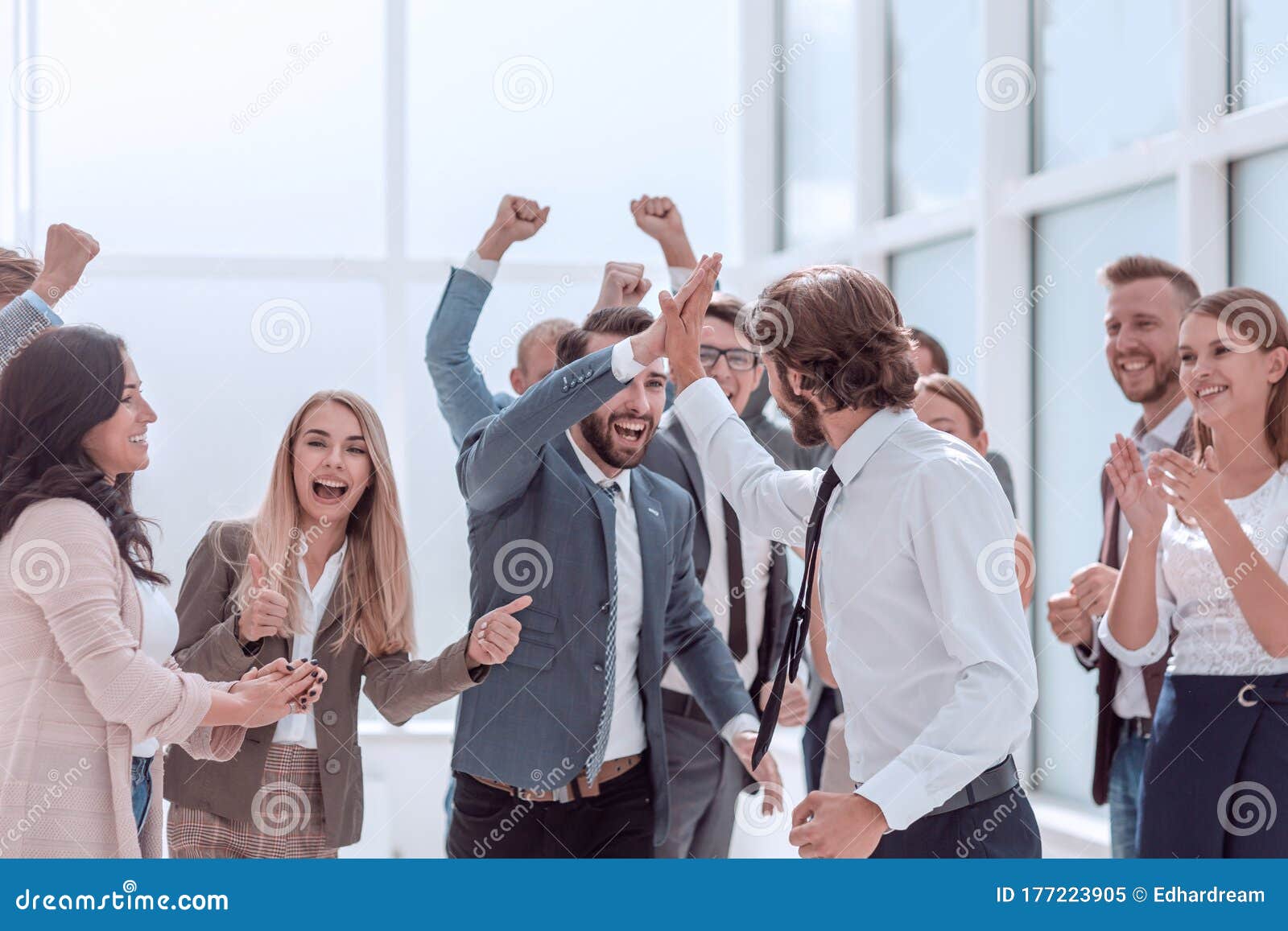 Corporate Group of Employees Congratulating Each Other on the Victory ...