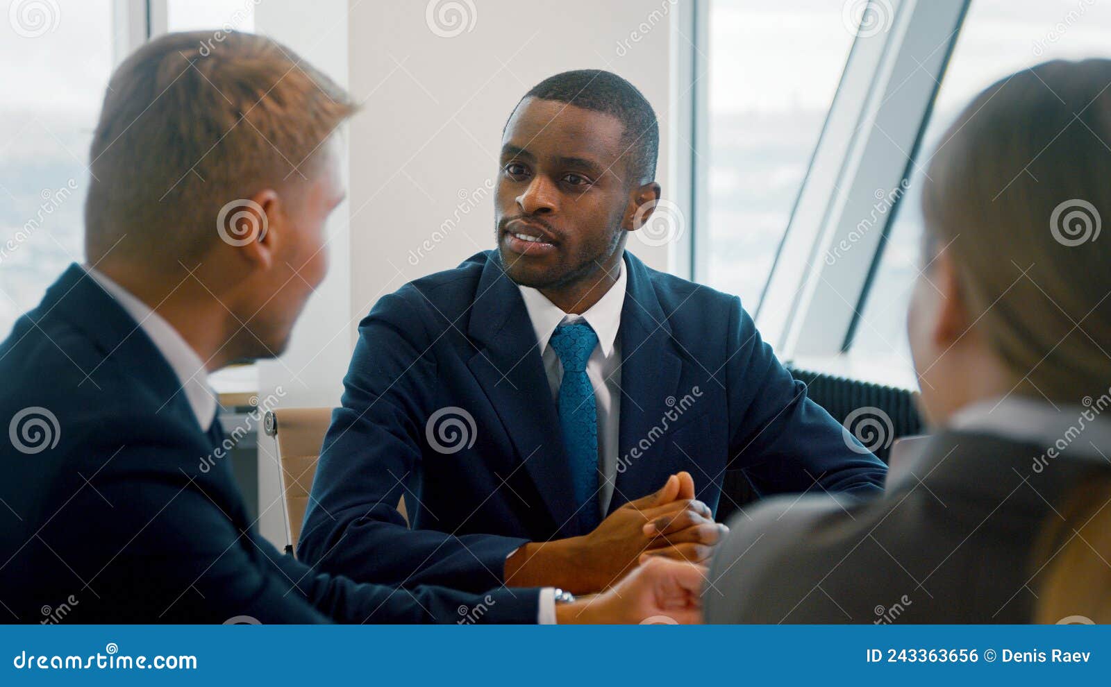 Corporate Leader Manager Communicating with His Team about a New ...