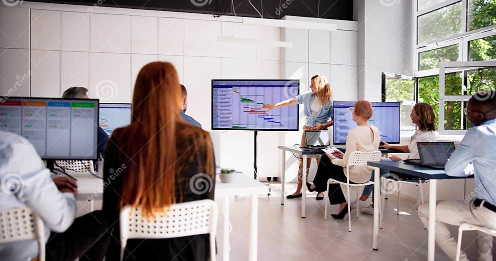 Corporate Training in a Black Classroom Stock Photo - Image of talk ...