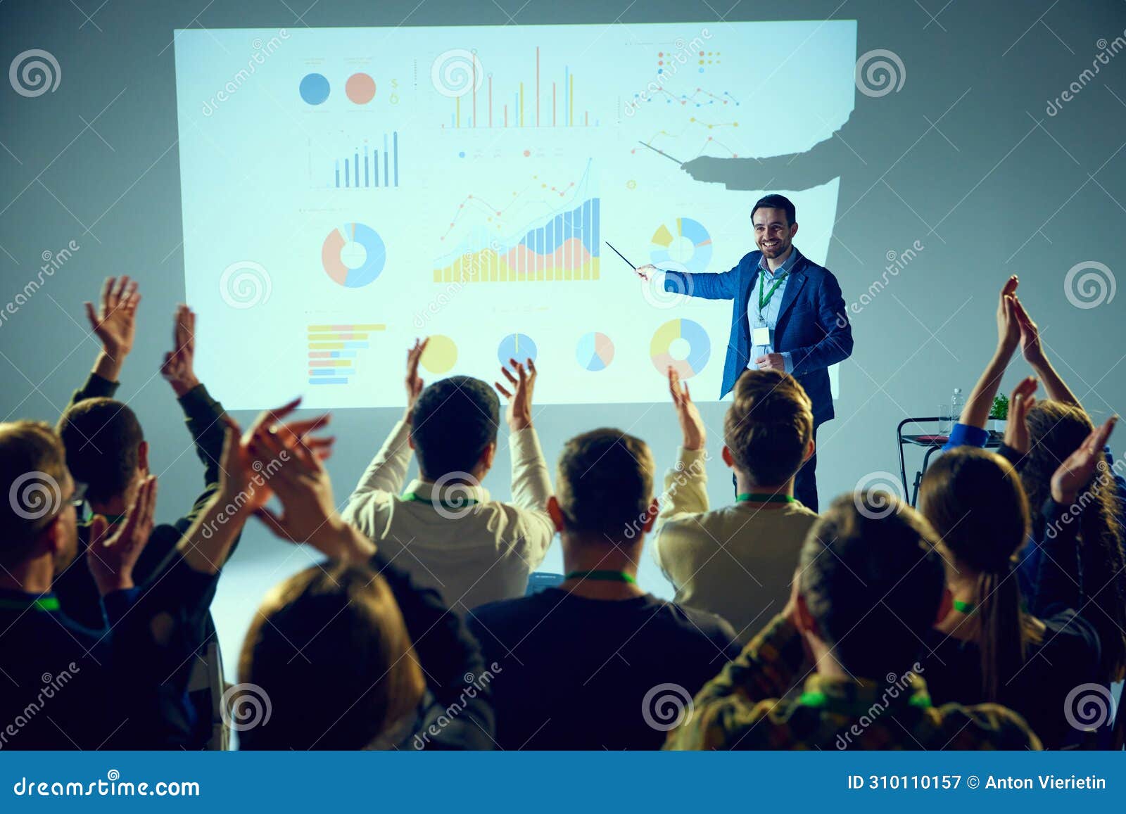 Corporate Training Lecture Surrounded by Data Visualizations Where Man ...