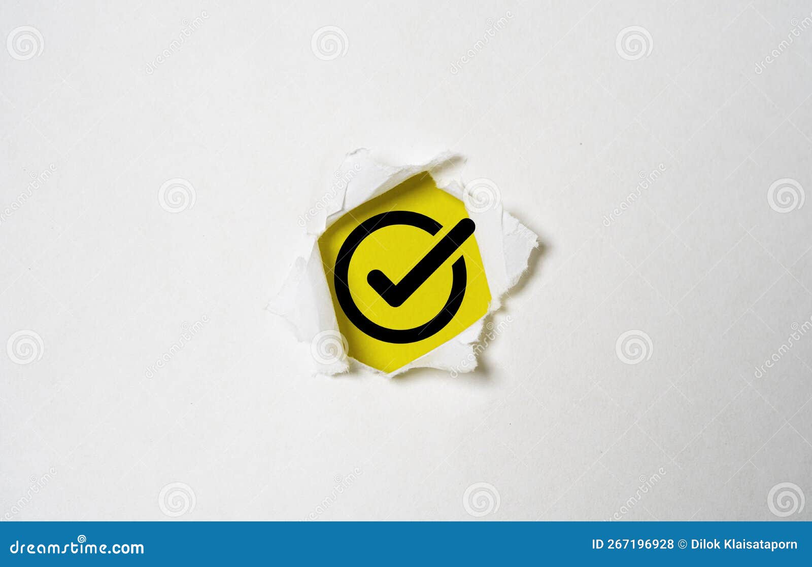 Correct Sign Symbol Inside of White Paper Punched for Document and ...