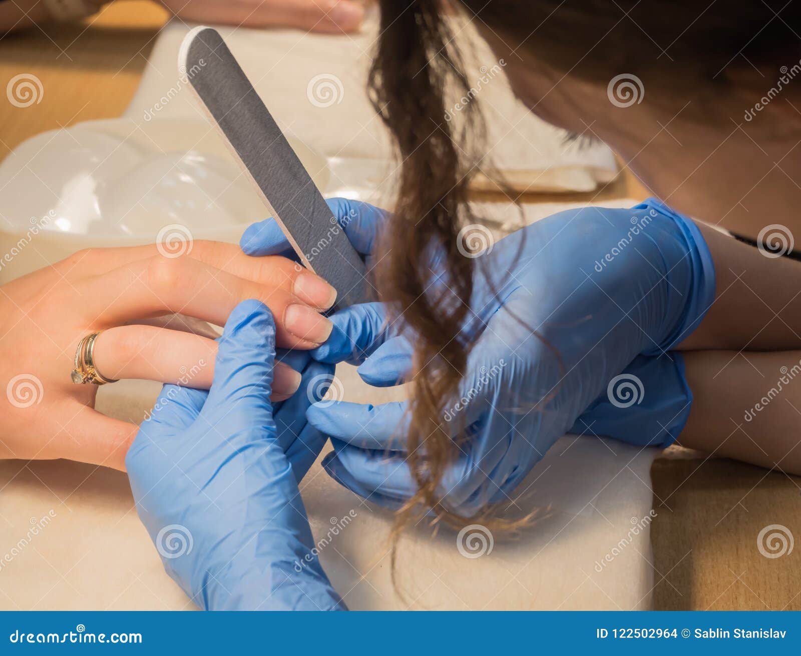 Correction of the Nail Shape in the Nail Salon. Manicure Procedures ...