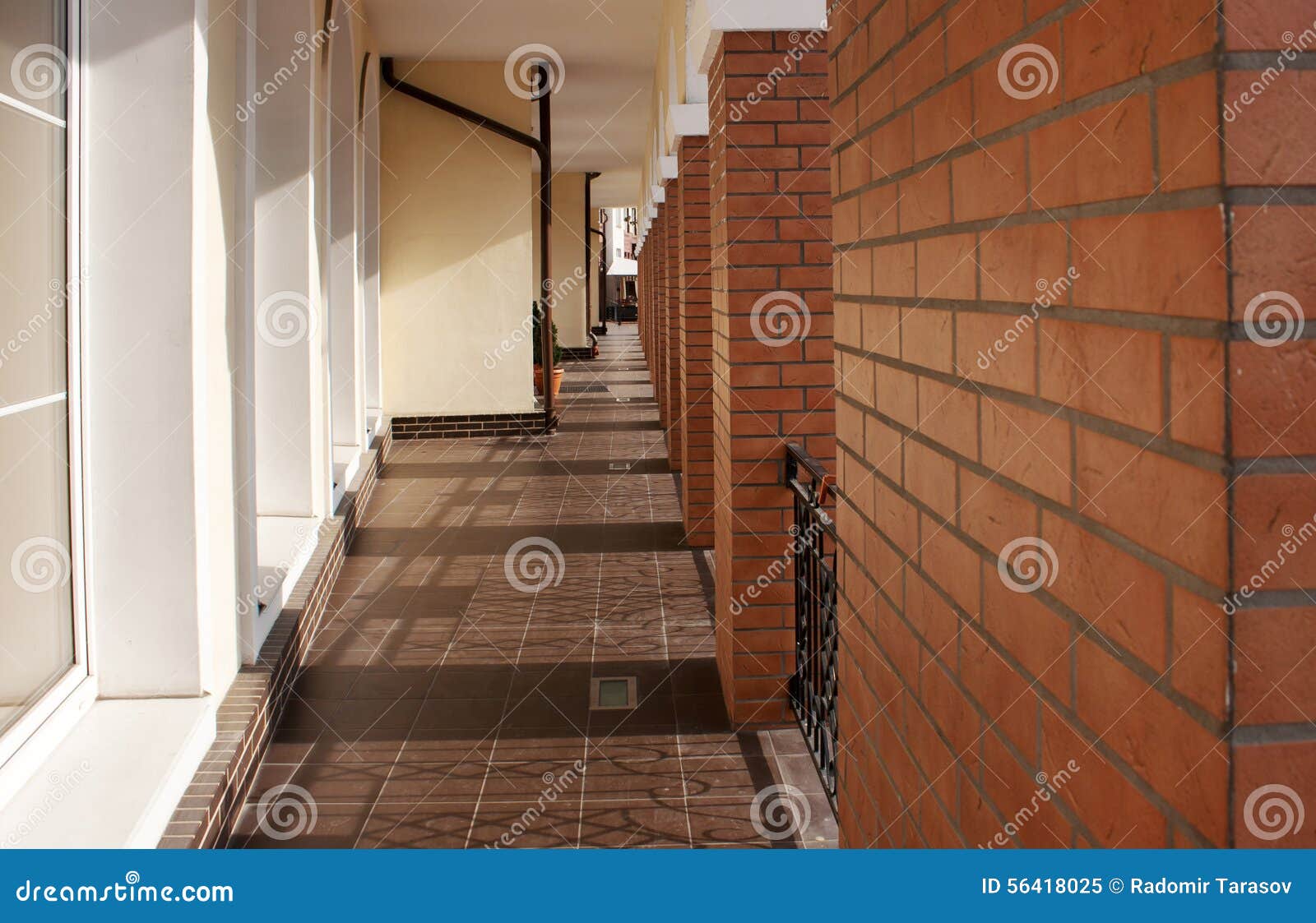 Corridor of brick walls stock image. Image of outdoors - 56418025