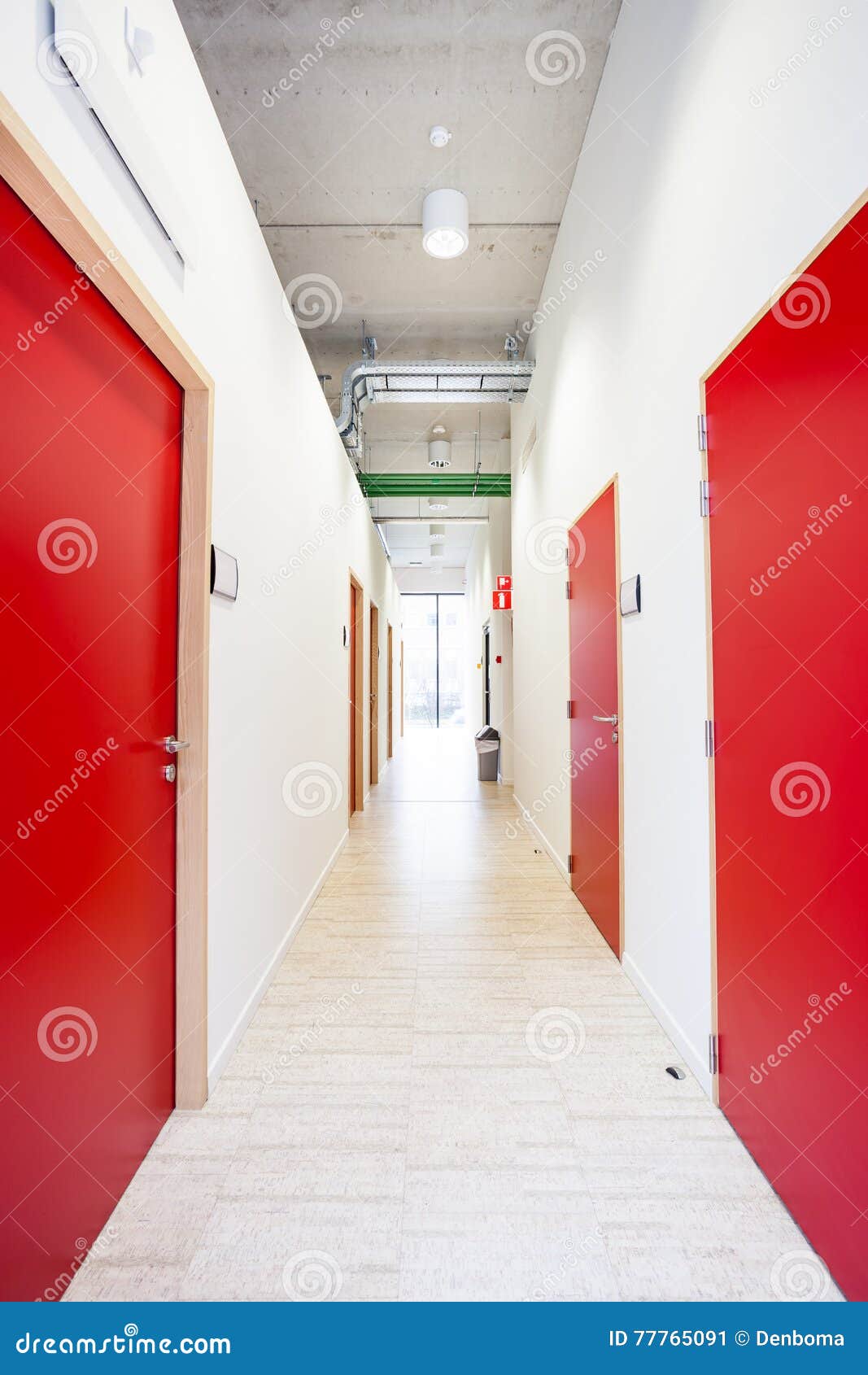 Corridor in an building stock image. Image of front, door - 77765091