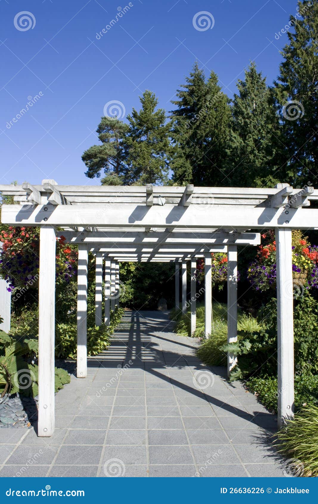 Corridor with Hanging Flowers Stock Photo - Image of gardens, front ...