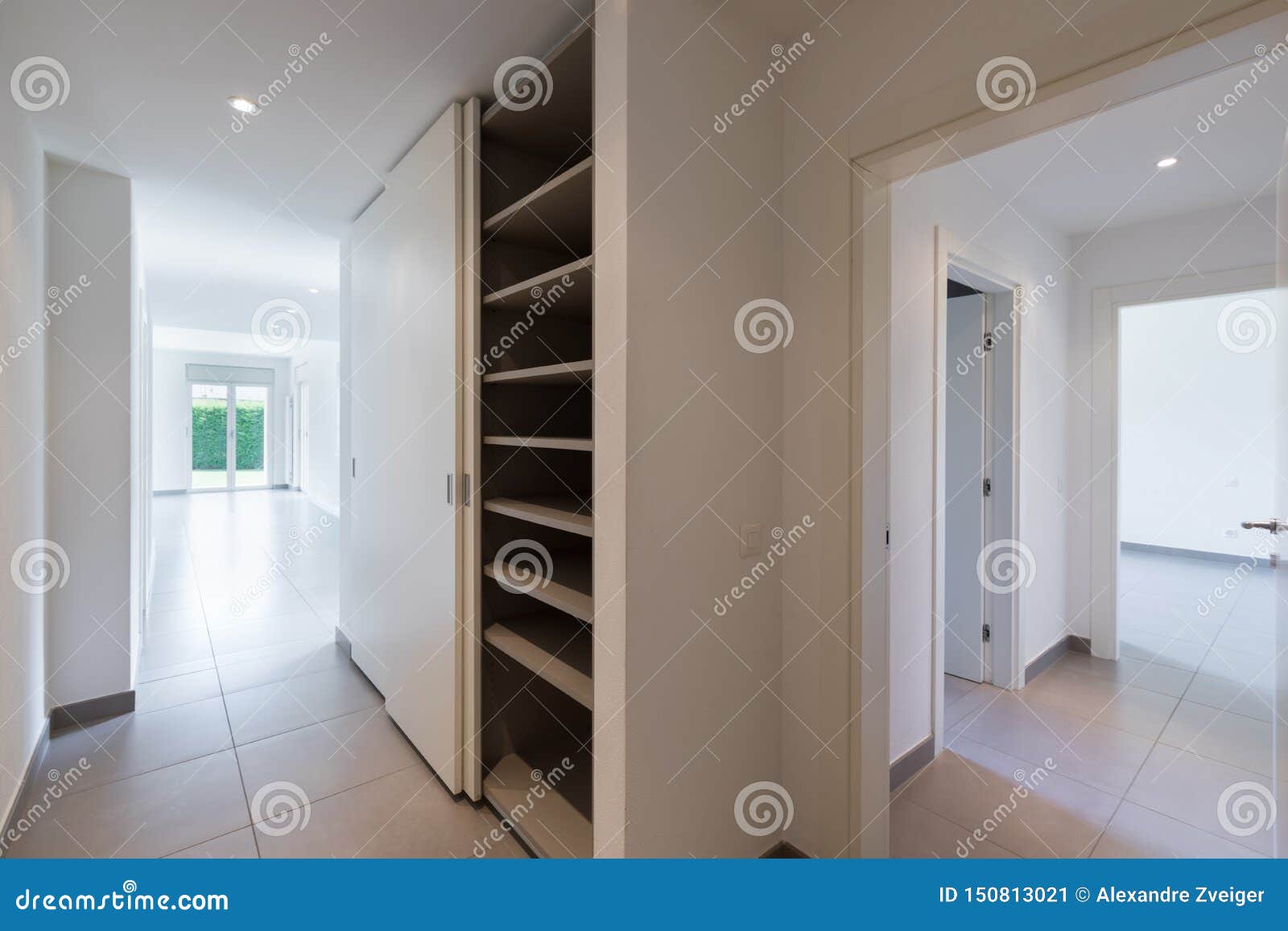 Corridor with Large Open Wardrobe and Lots of Open Doors Stock Image ...