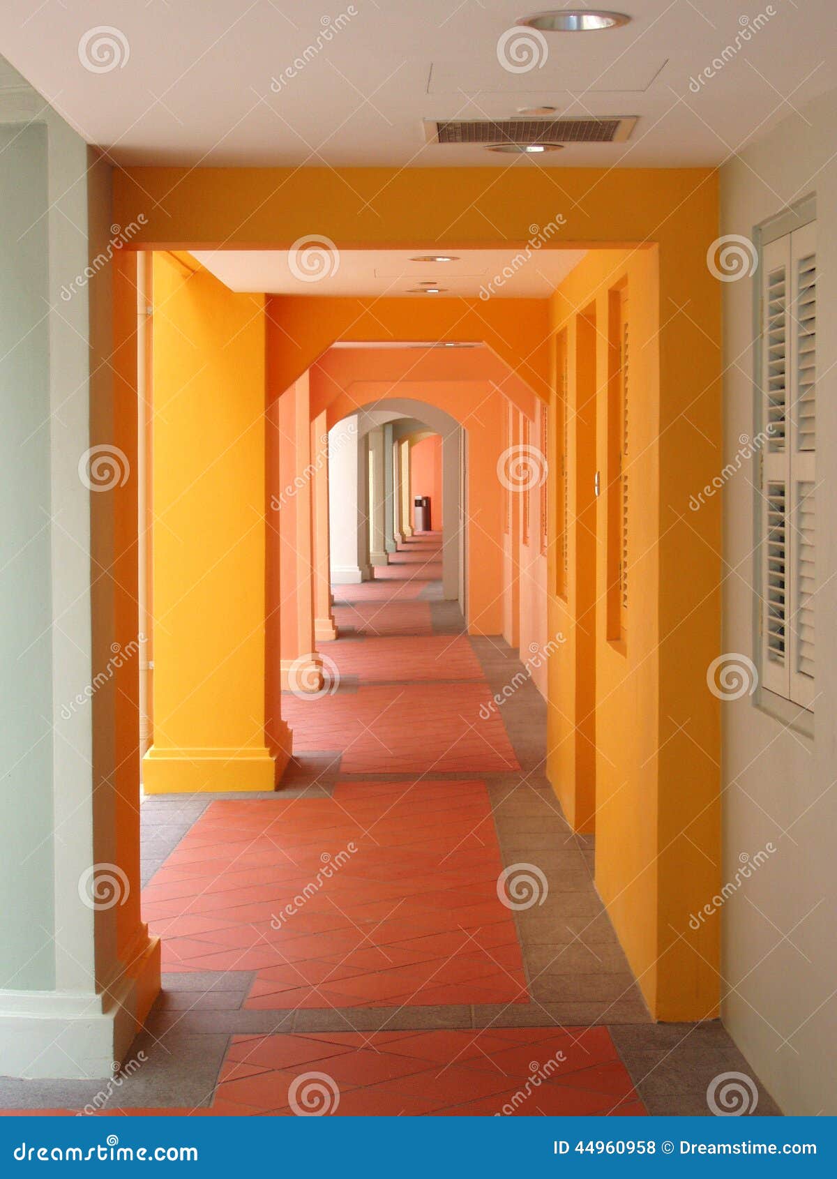 Corridor of Multi-Colored Buildings Stock Photo - Image of alleyway ...