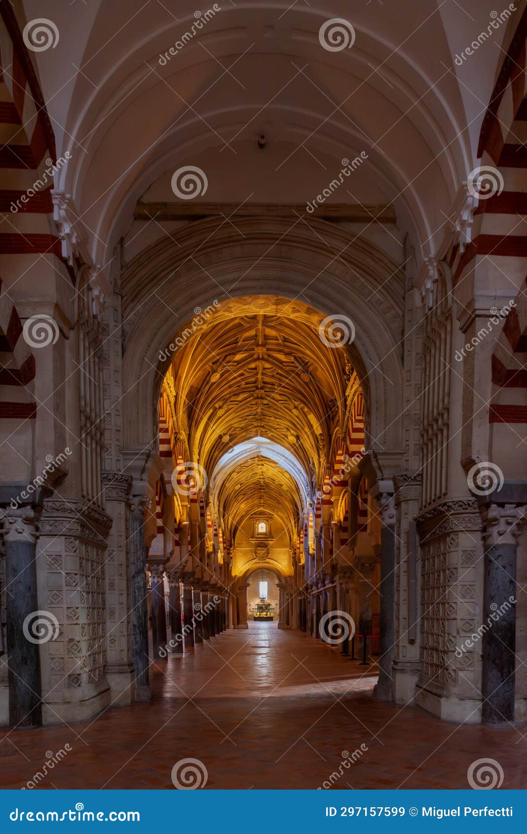 Corridor between Pillars and Decorated Arches with Views of a Chapel in ...