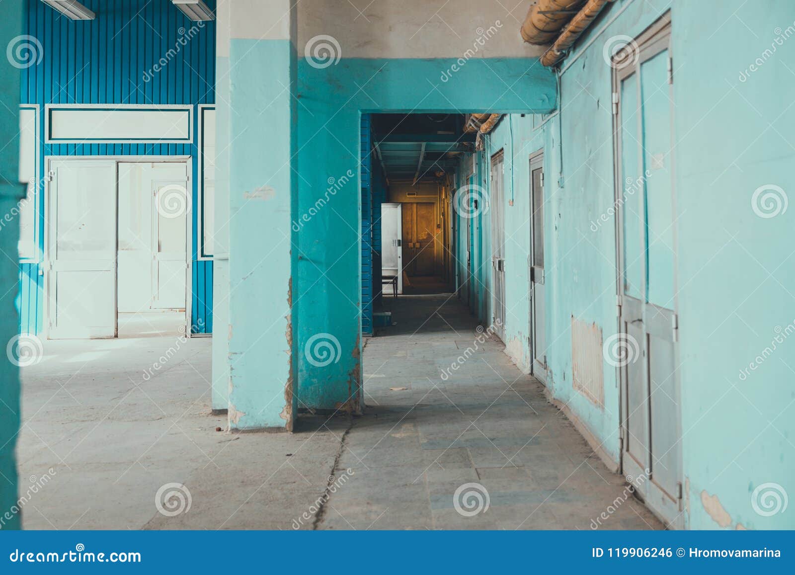 A blue corridor stock photo. Image of door, decay, floor - 119906246