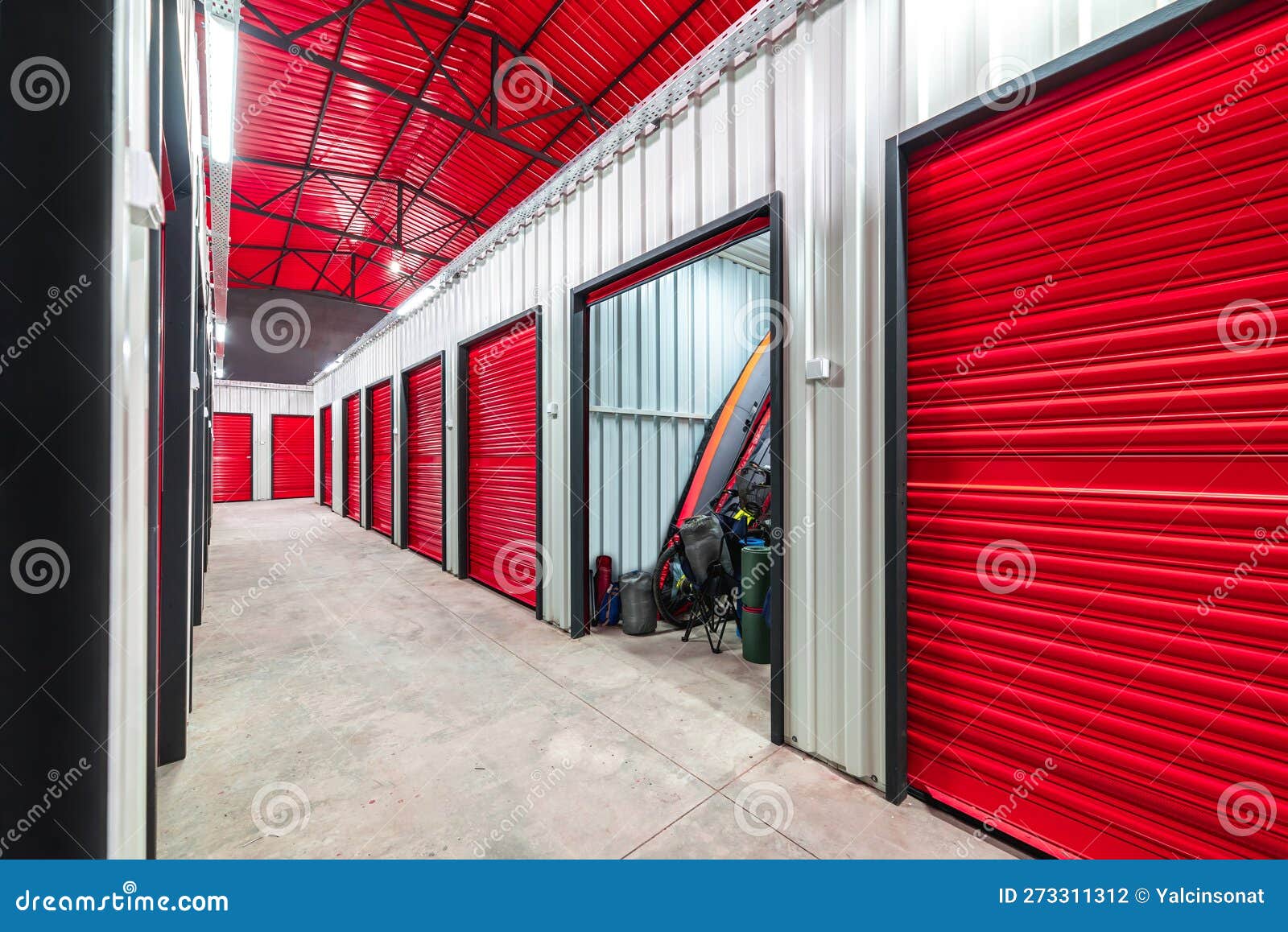Corridor of Self Storage Unit with Red Doors. Rental Storage Units ...