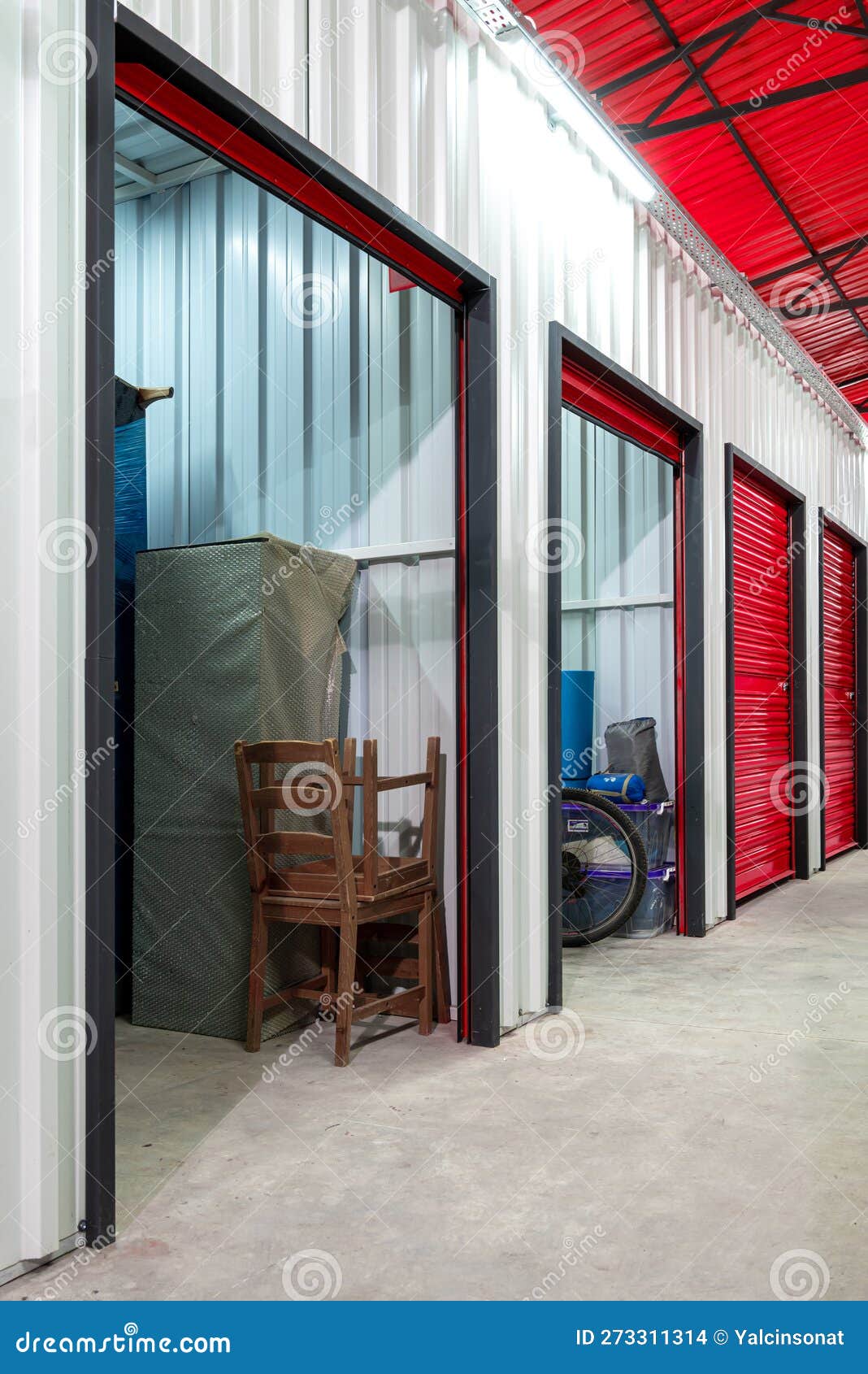 Corridor of Self Storage Unit with Red Doors. Rental Storage Units ...