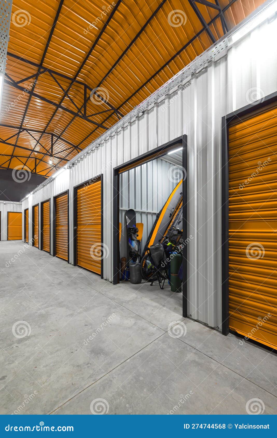 Corridor of Self Storage Unit with Red Doors. Rental Storage Units ...