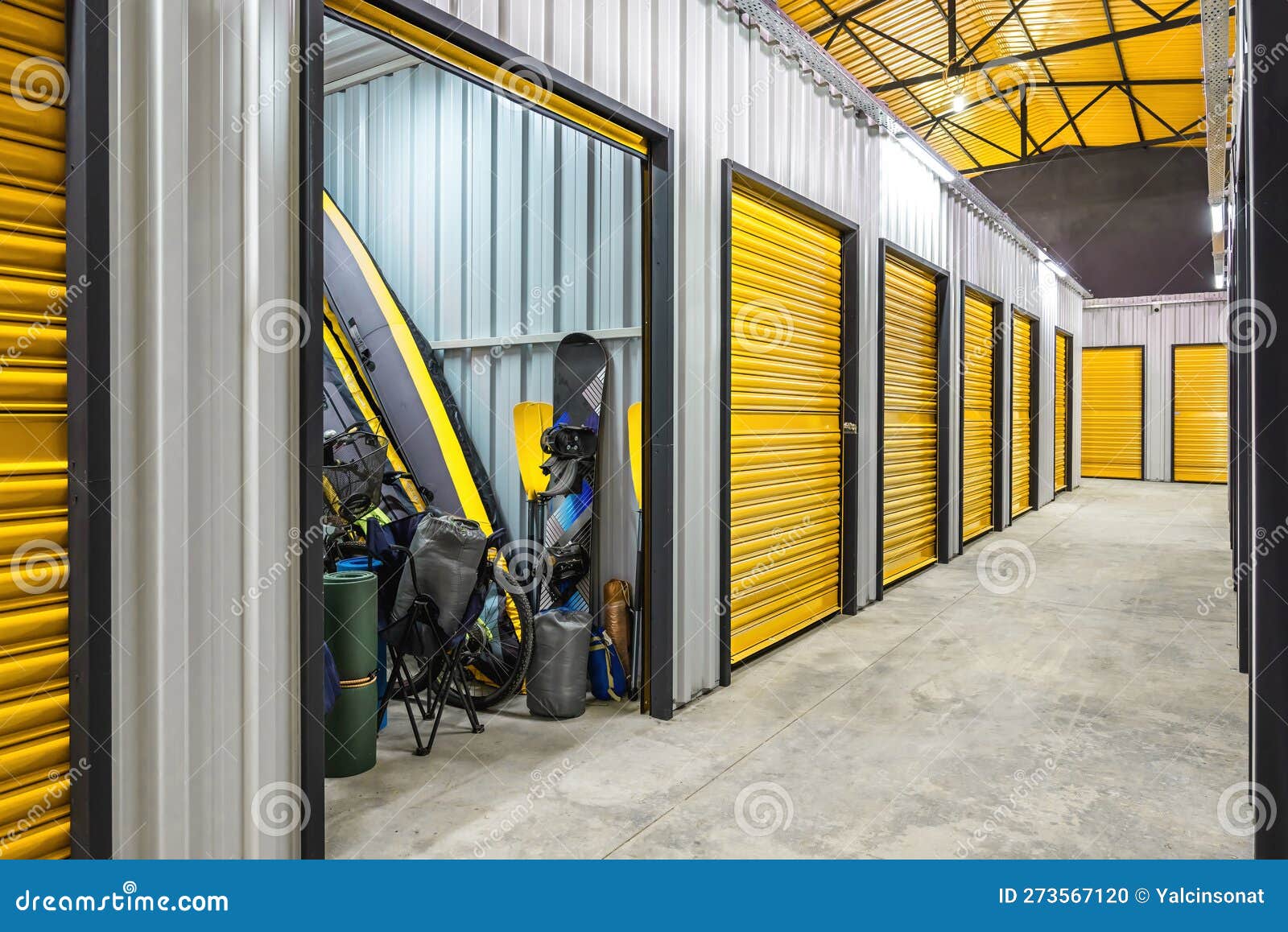 Corridor of Self Storage Unit with Yellow Doors. Rental Storage Units ...