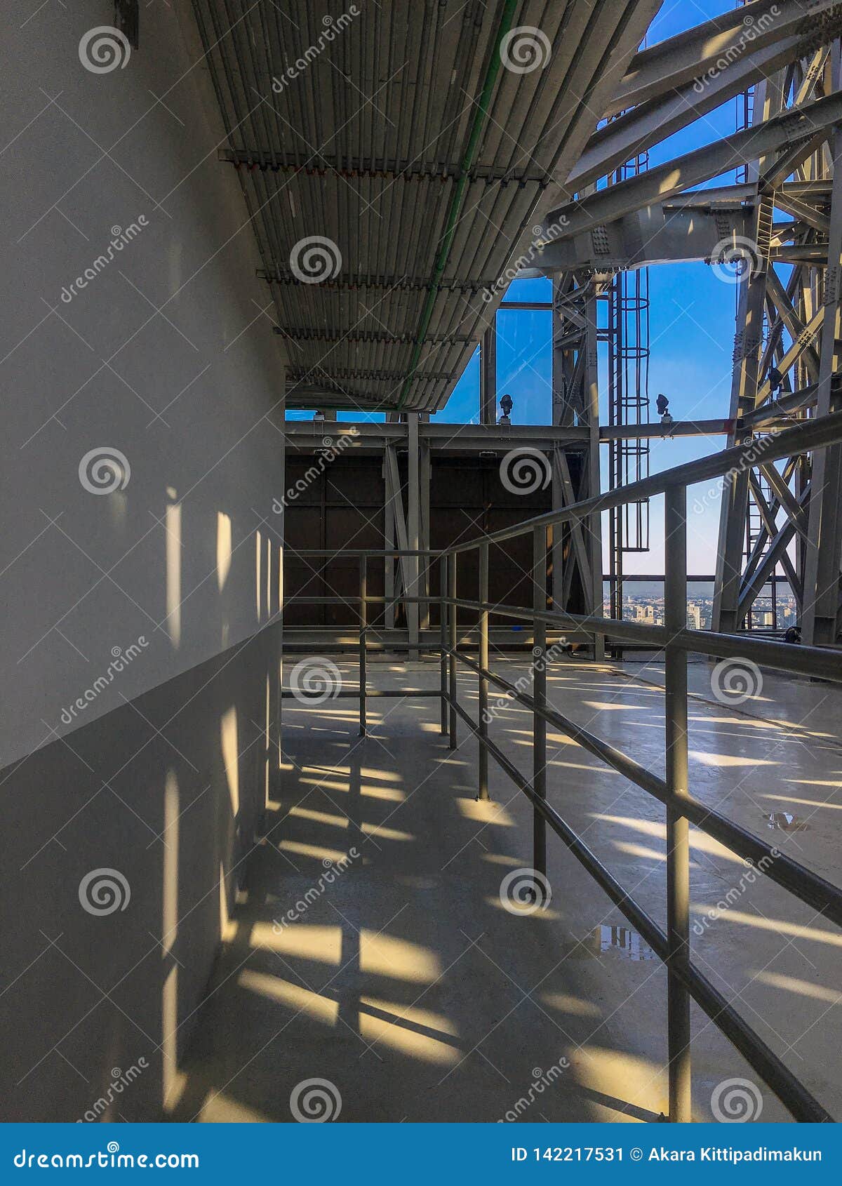 Corridor with Rail and Conduits on the Ceiling on the Rooftop of ...