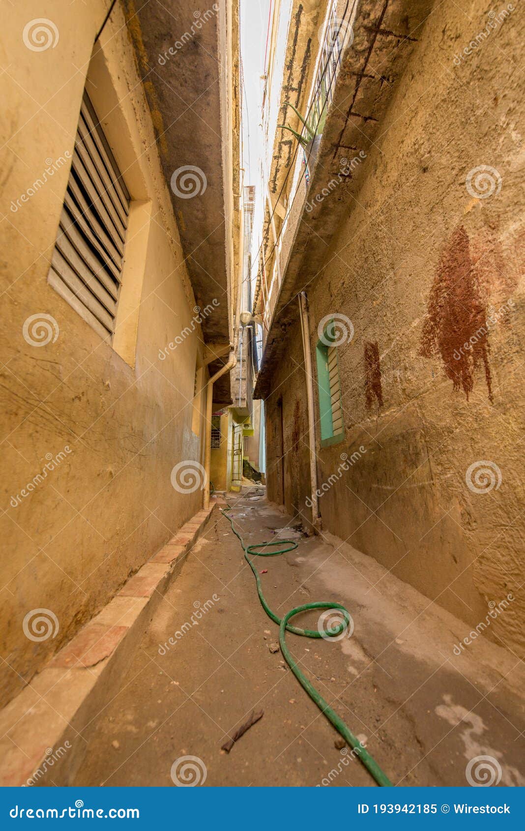 Corridor of Street between Two Small Buildings Stock Image - Image of ...