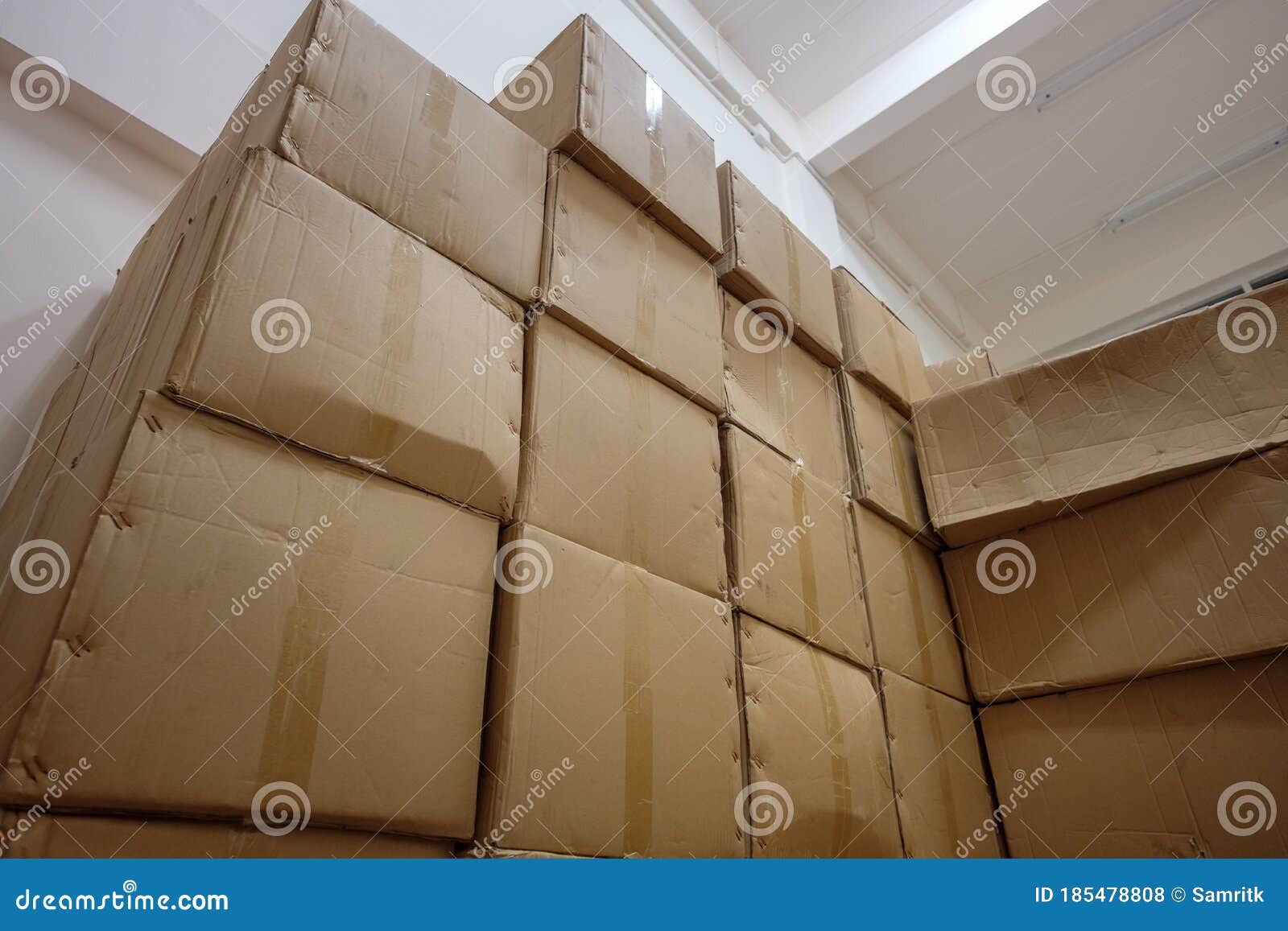 Corrugated Cardboard Storage Boxes Stacked in Warehouse Stock Photo ...