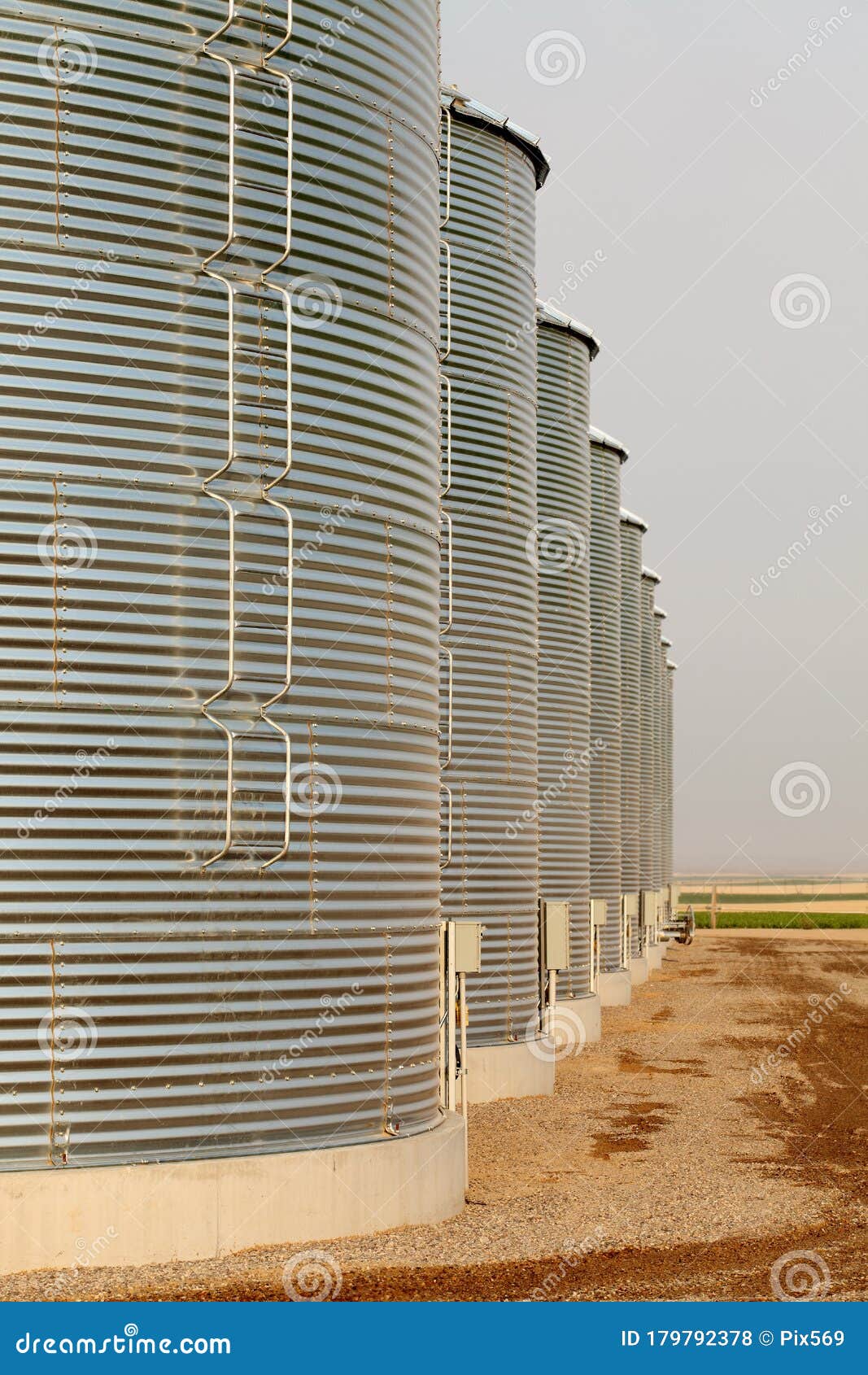 A Row of Corrugated Metal Granaries. Stock Photo - Image of container ...
