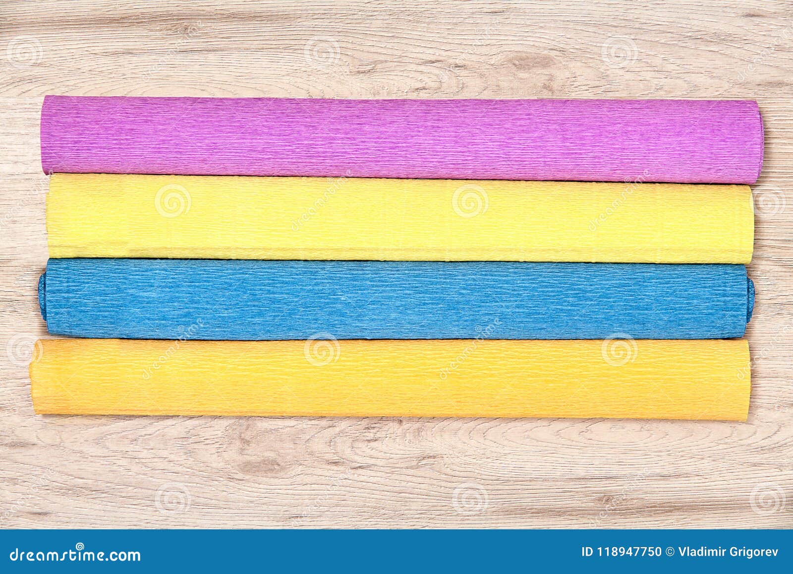 Four Different Colored Crepe Paper Rolls are on Board. Stock Photo ...