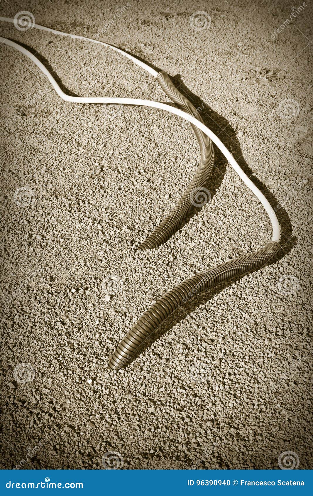 Corrugated Pipe with Cable Coming Out from the Ground Stock Photo ...