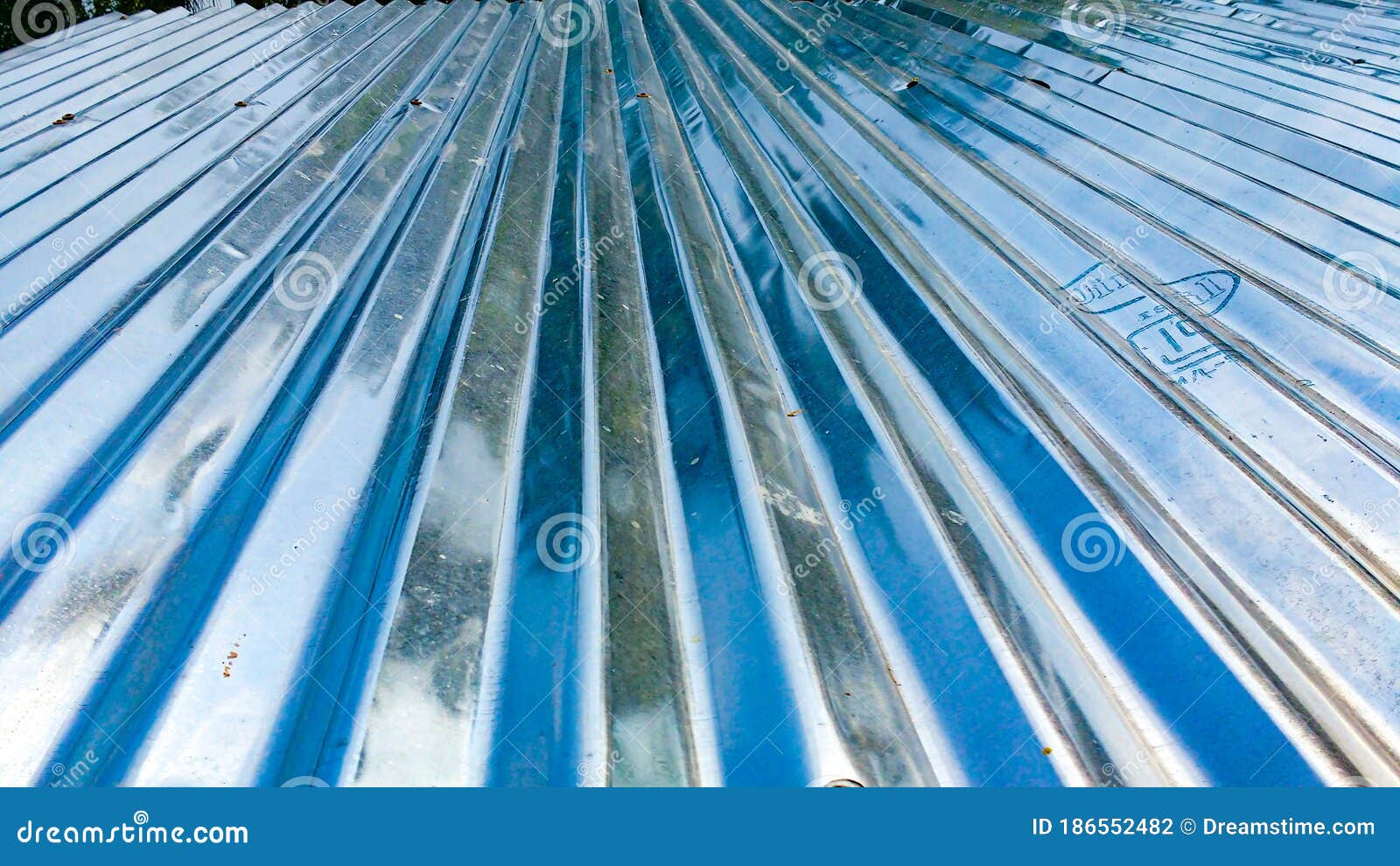 This is a corrugated tin stock photo. Image of branch - 186552482