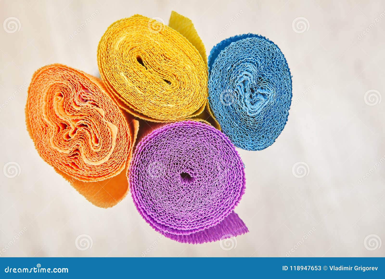 Corrugated Wrapping Paper is Twisted into Four Colored Rolls. Stock ...
