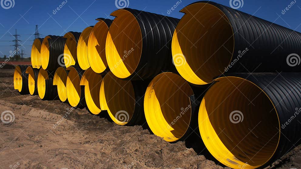 Corrugated yellow pipe stock photo. Image of construction - 27356554