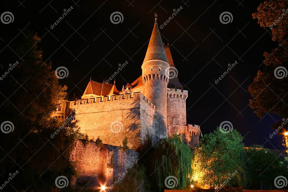 Corvin Castle in the night stock photo. Image of bricks - 13845364