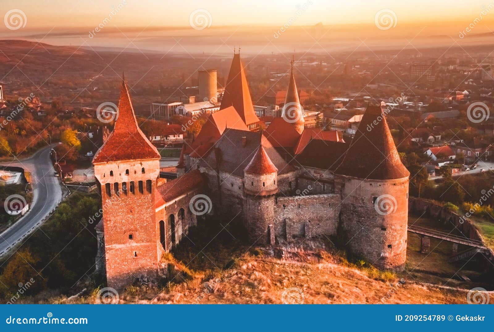 Corvin Castle at sunset stock image. Image of architecture - 209254789