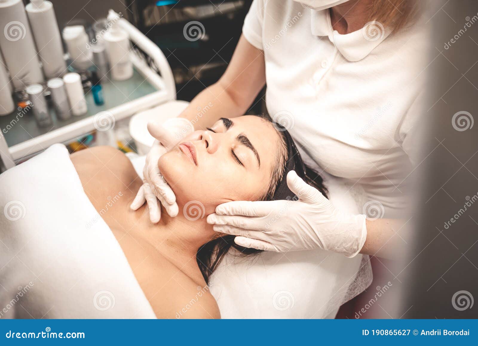Cosmetologist Massages The Client`s Face Stock Image Image Of