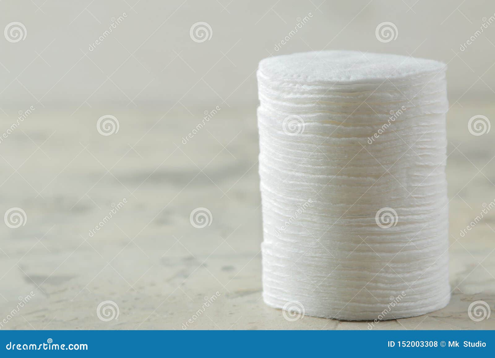 Cosmetic Cotton Pads. a Stack of Cotton Pads on a Light Concrete ...