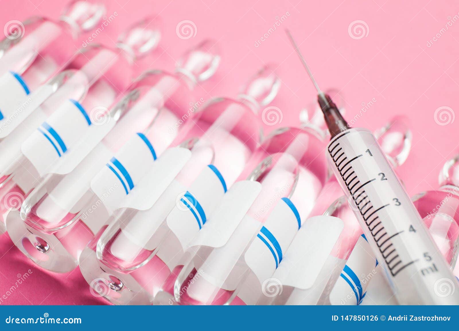 Cosmetic Injection for Beauty and Plastic Surgery on a Pink Background ...