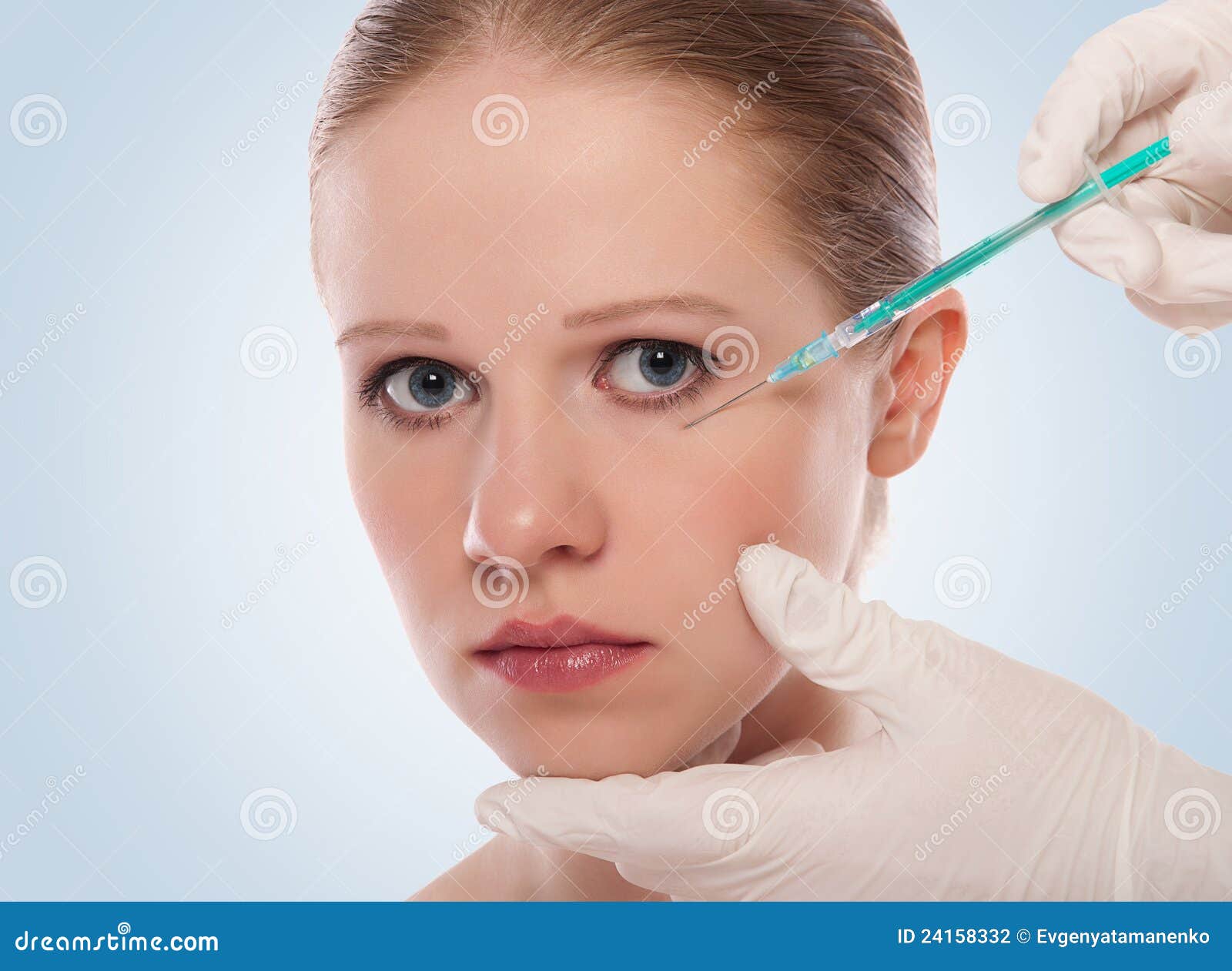 Injection Of Botox In Female Lips And Holding Syringe Closeup Of