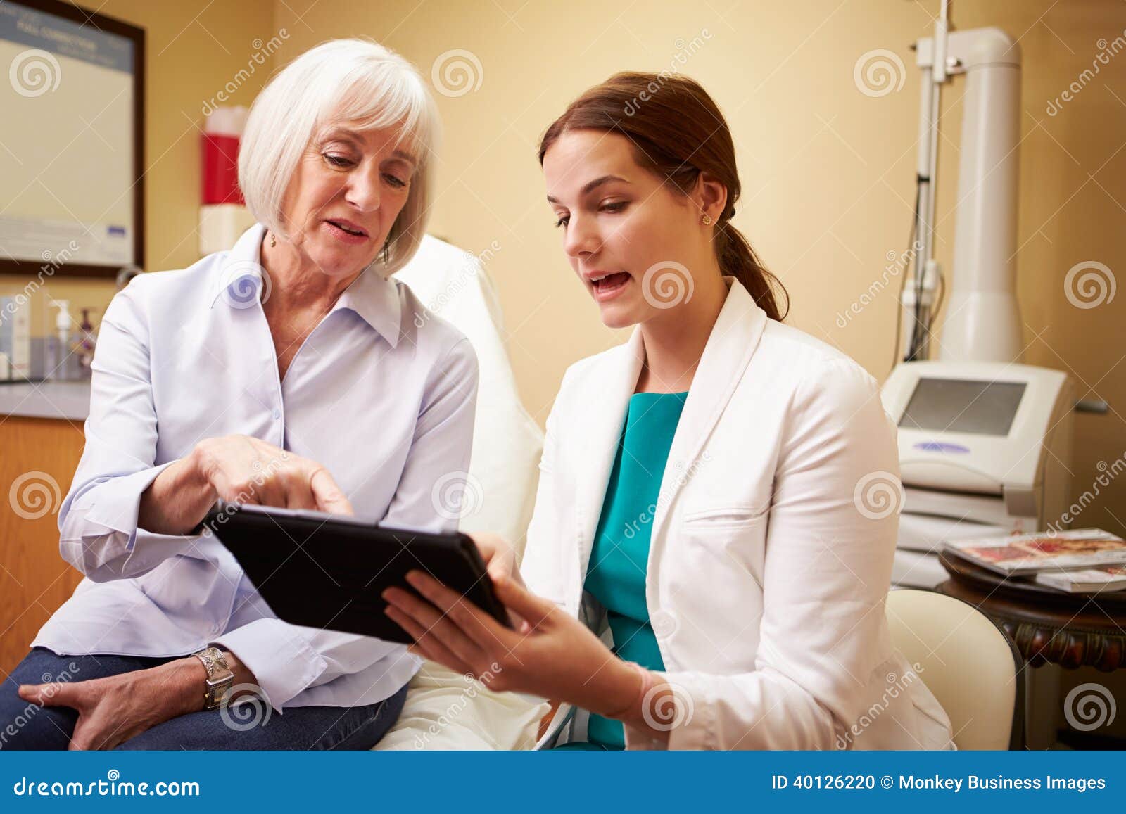 Cosmetic Surgeon Discussing Procedure with Client in Office Stock Photo ...
