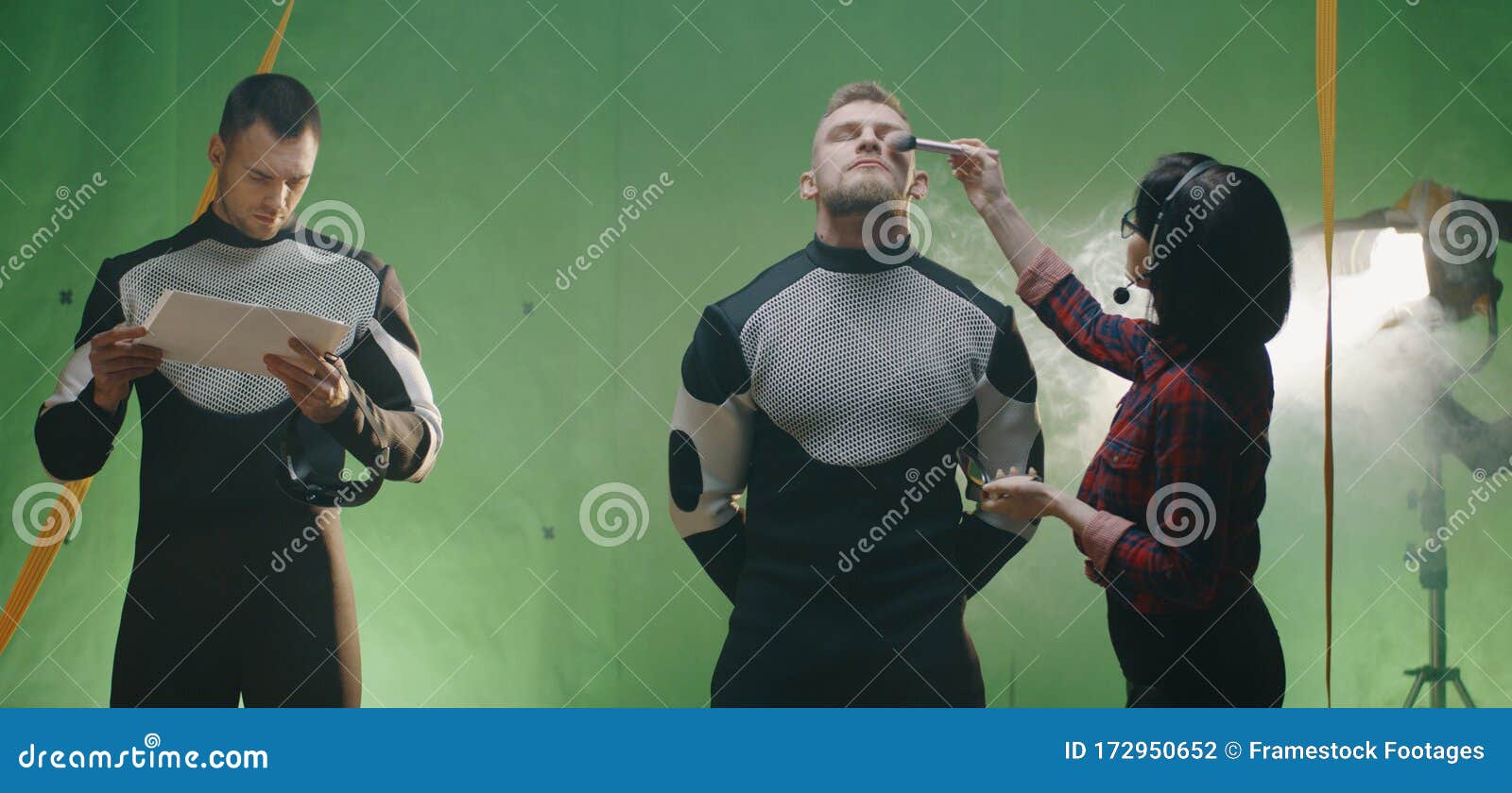 Cosmetician Preparing an Actor while Others Discussing Stock Photo ...