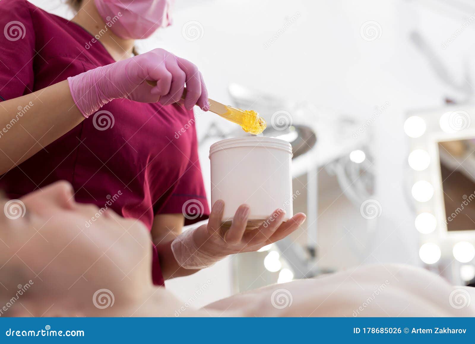 Cosmetician Takes the Sugar Paste from the Jar. Shugaring. Sugar Paste ...