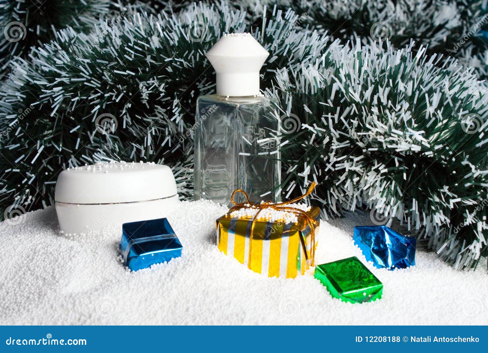 Cosmetics set on snow. stock photo. Image of isolated - 12208188