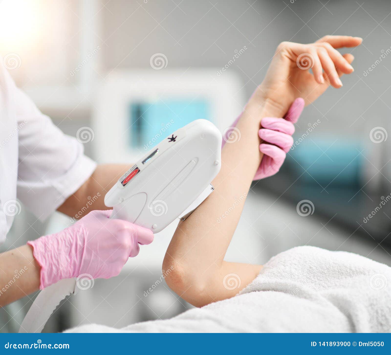 Cosmetologist In Gloves Performes A Procedure On Patient`s Hand With