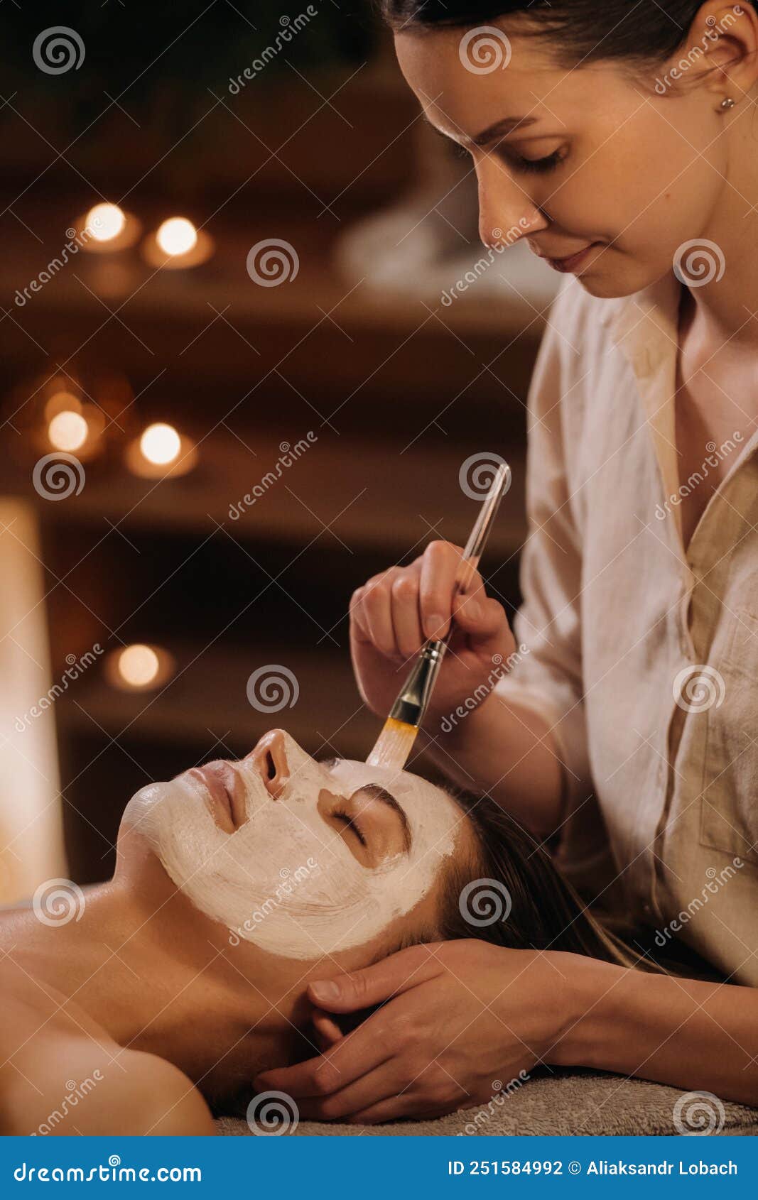 A Cosmetologist Makes A Mask For A Womanand X27 S Face To Rejuvenate The