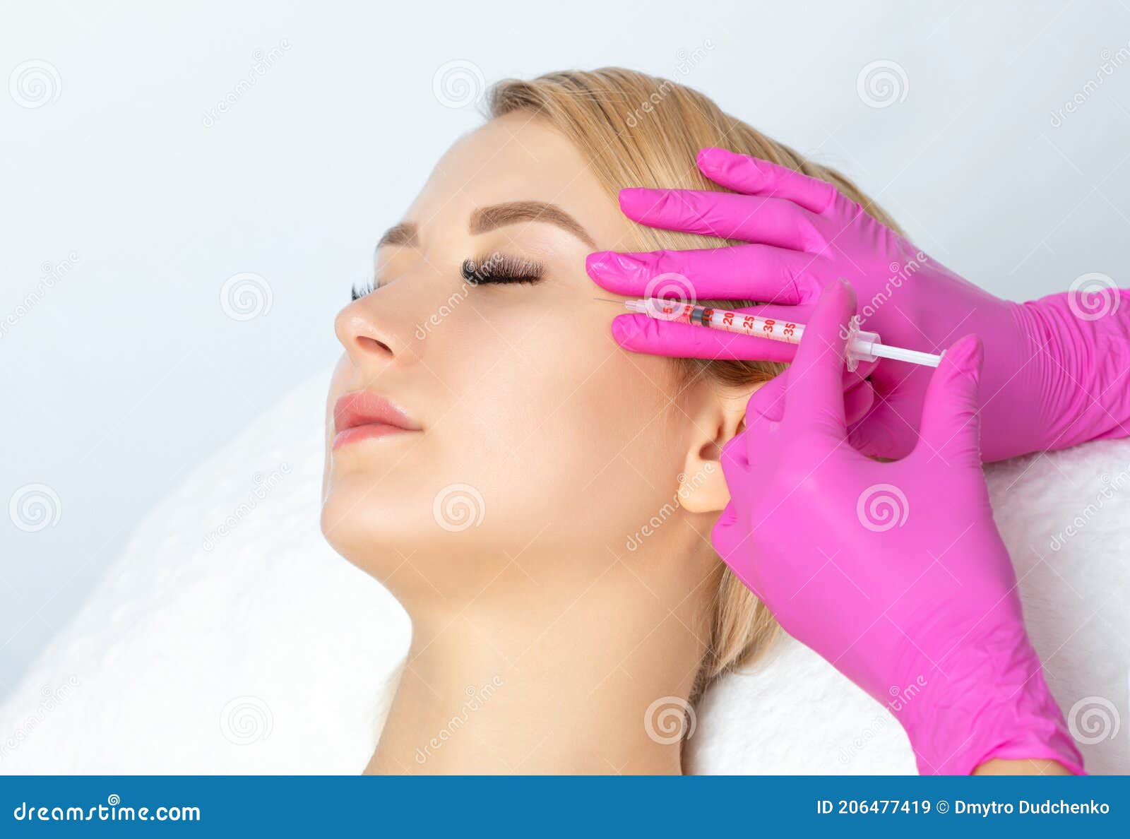 Cosmetologist Makes Rejuvenating Anti Wrinkle Injections On The Face Of