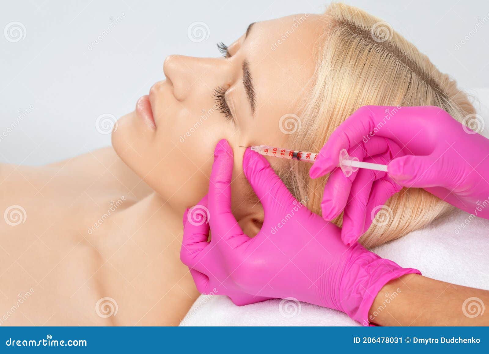 Cosmetologist Makes Rejuvenating Anti Wrinkle Injections On The Face Of
